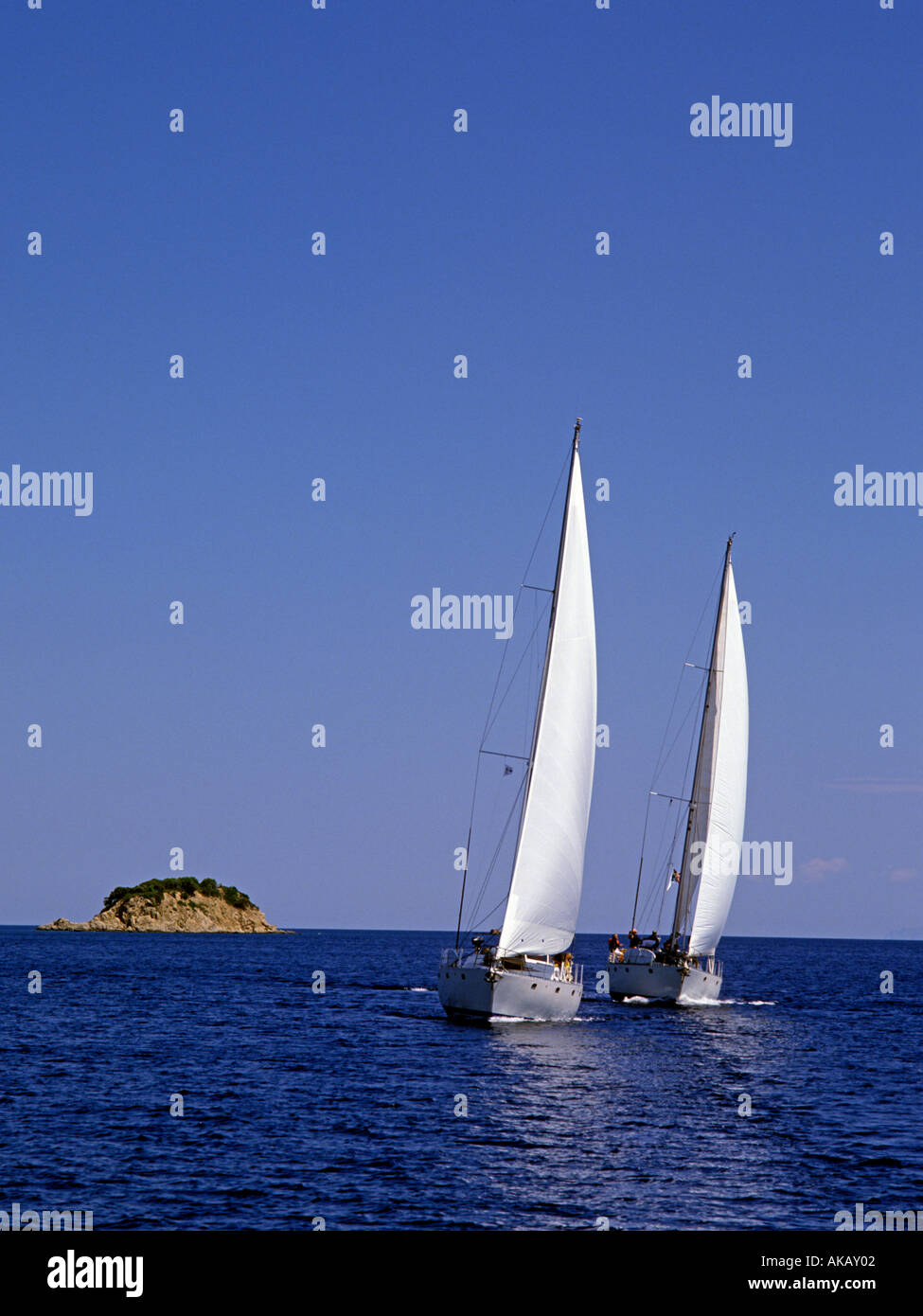 Two yachts sailing close together Stock Photo - Alamy