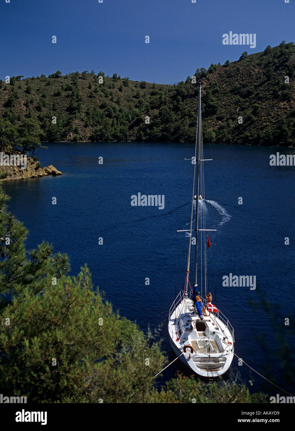 Single yacht moored in secluded inlet in Turkey Stock Photo - Alamy