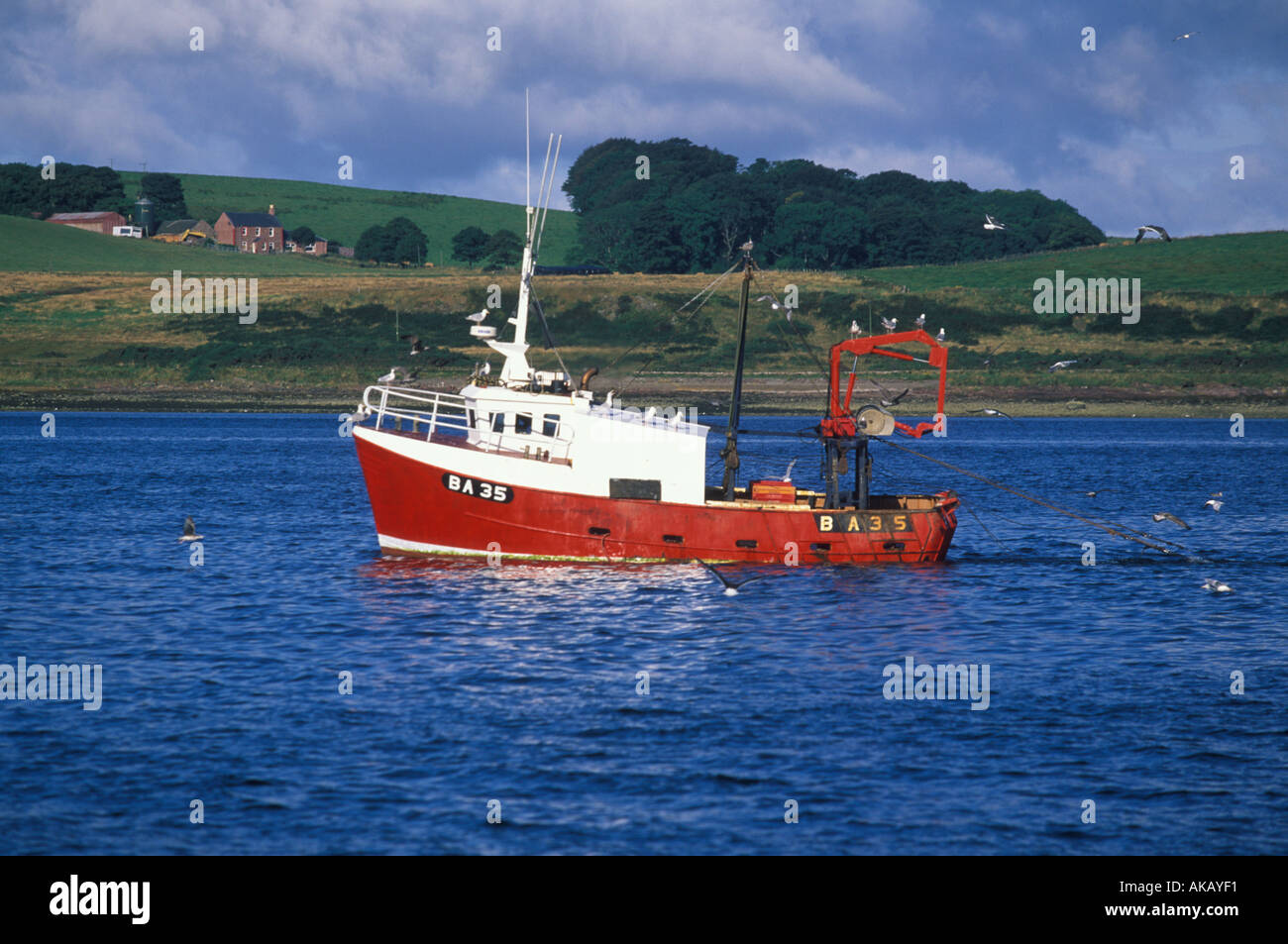 Small trawler boat on the Clyde fishing off Great Cumbrae Island ...