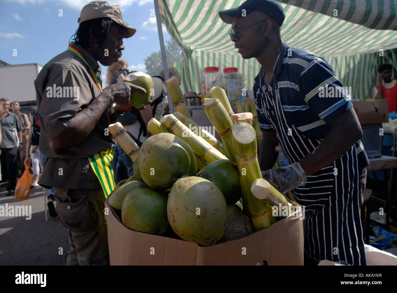 Stall in Notting Hill selling coconuts and sugarcane Stock Photo - Alamy