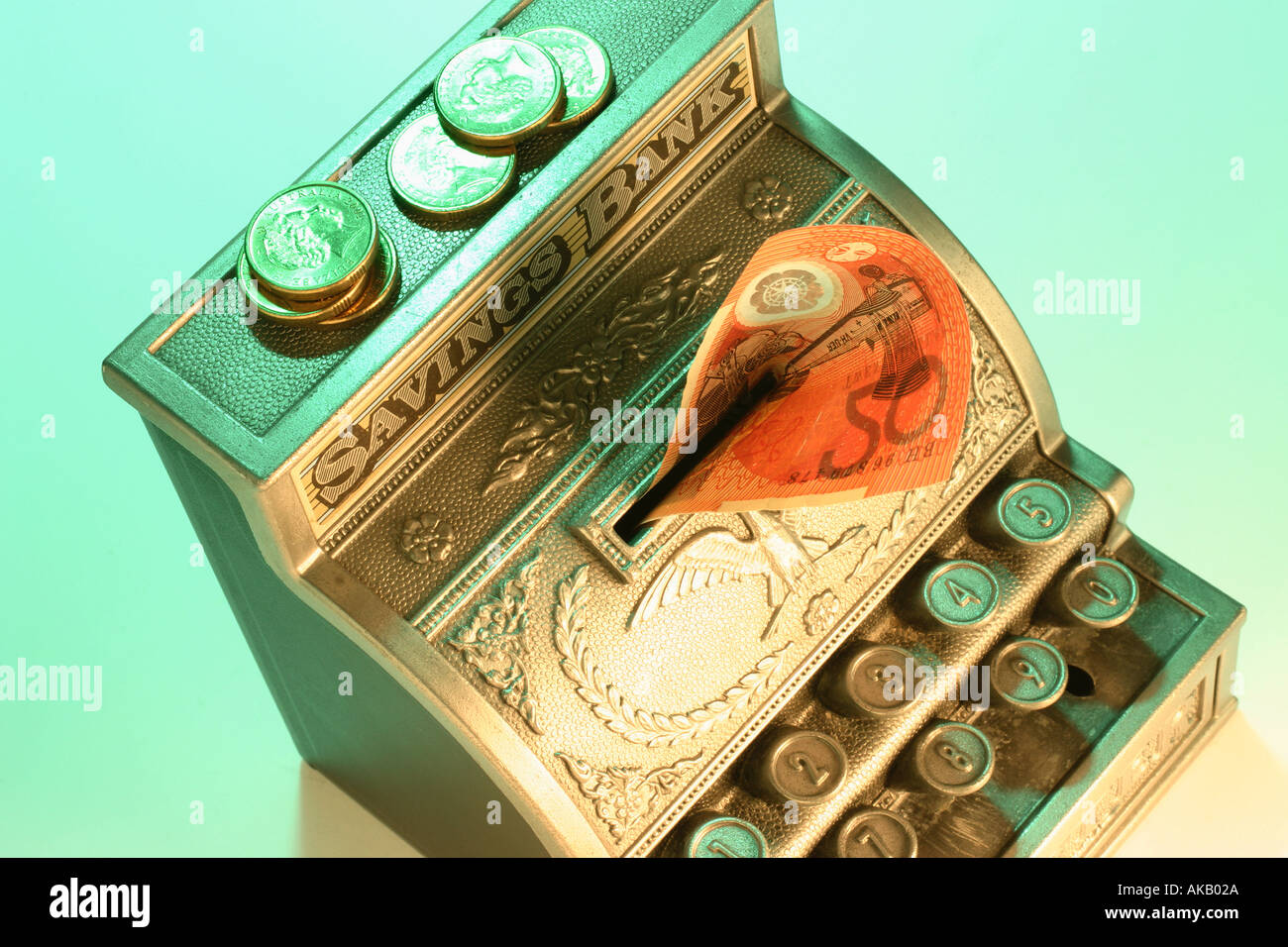 Toy Cash Register with Banknote and Coins Stock Photo - Alamy
