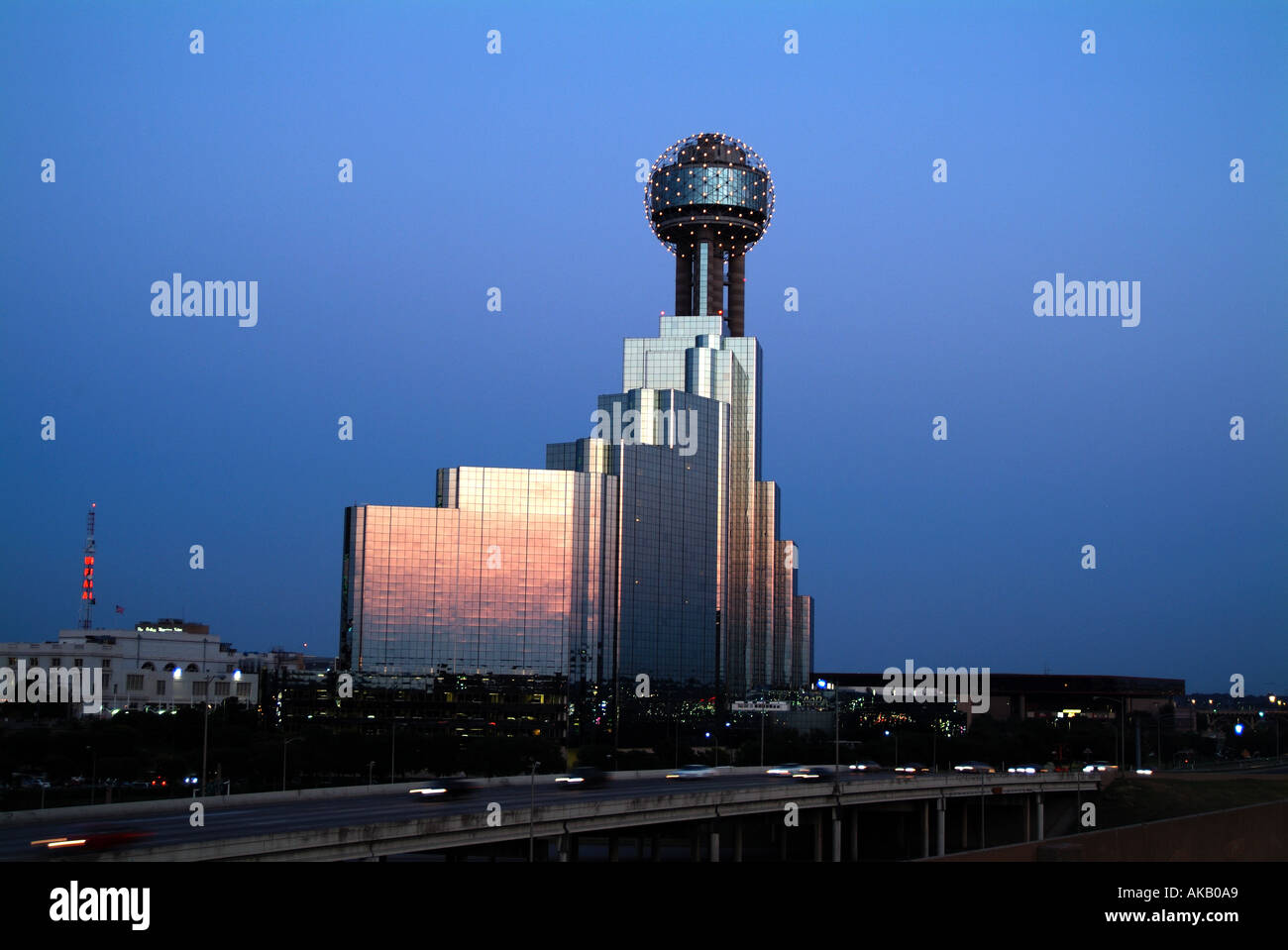 Arena Tower in Dallas at dusk Stock Photo - Alamy