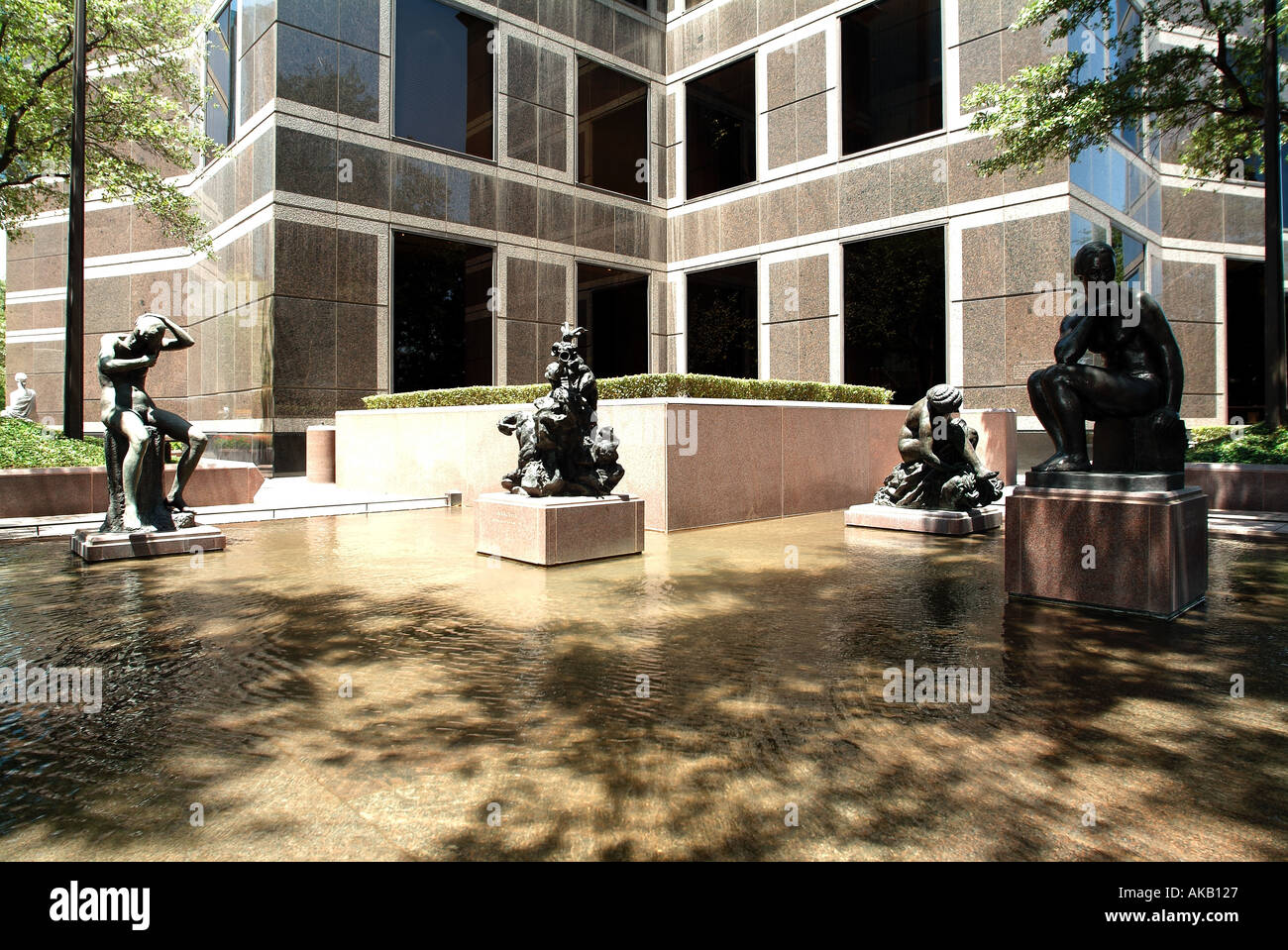 Park with statues under the sun in downtown of Dallas Stock Photo - Alamy