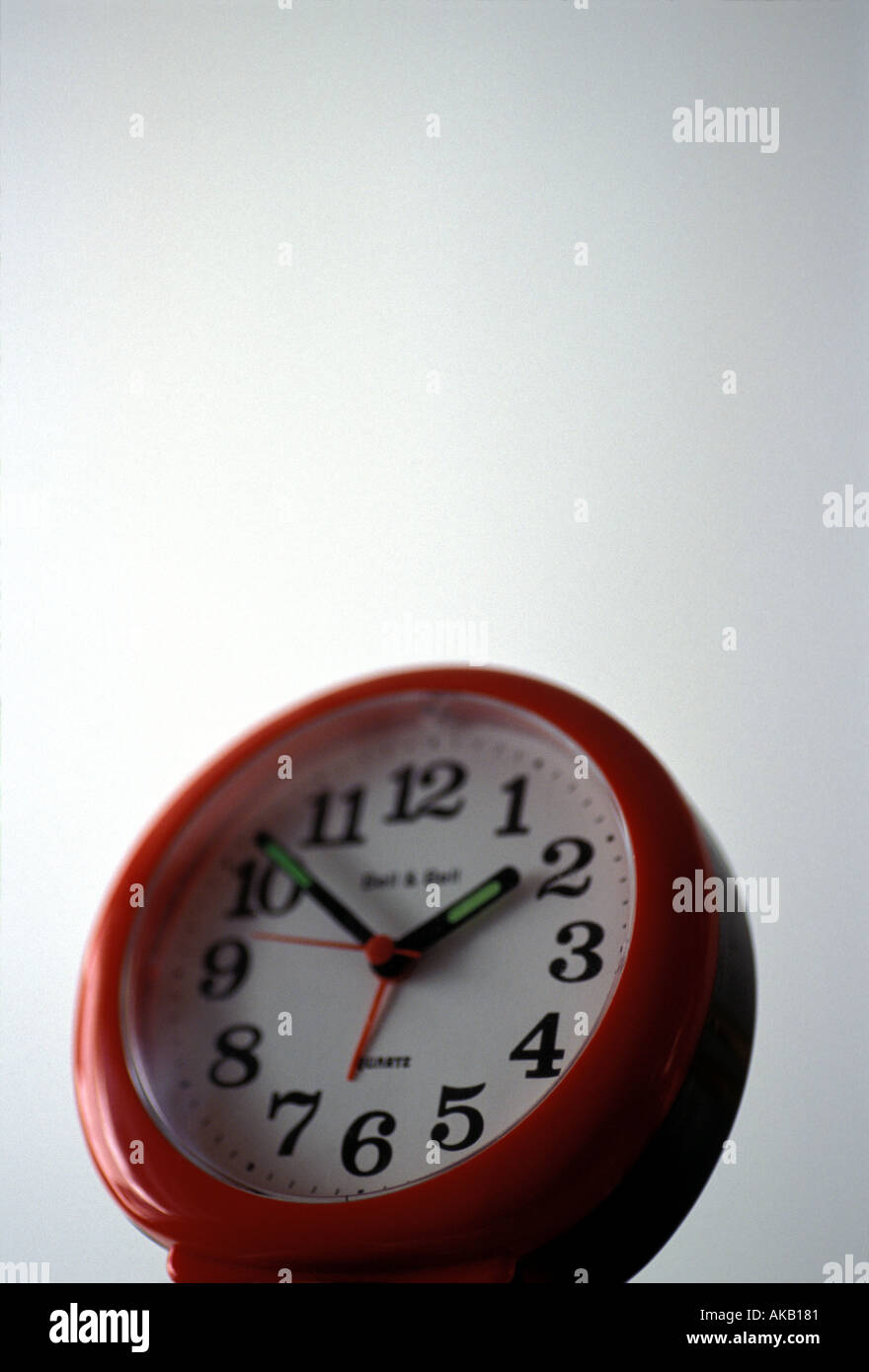 Red alarm clock Stock Photo - Alamy