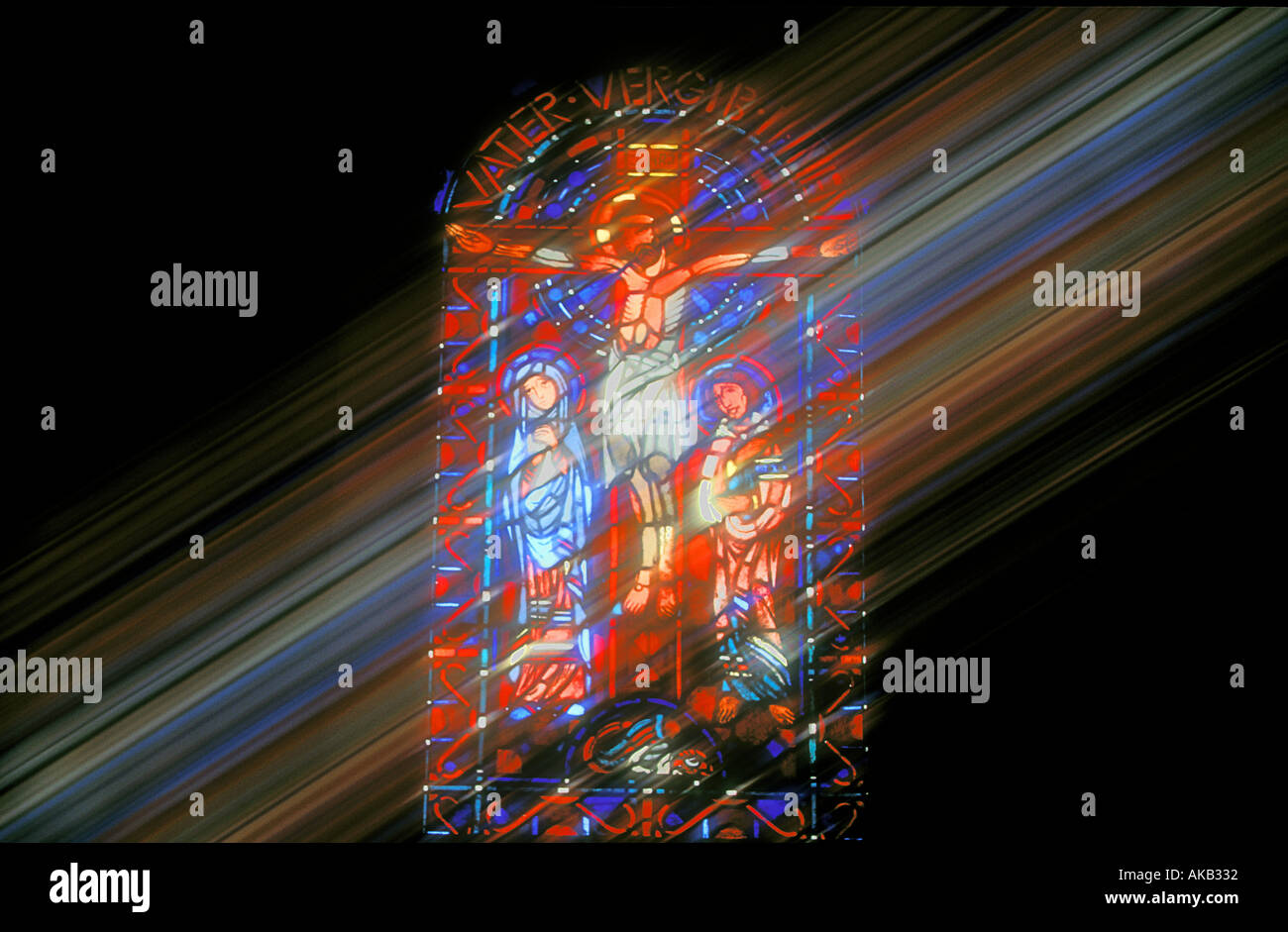 Stained glass window with sun streaks at Elsdorf in Germany Stock Photo ...