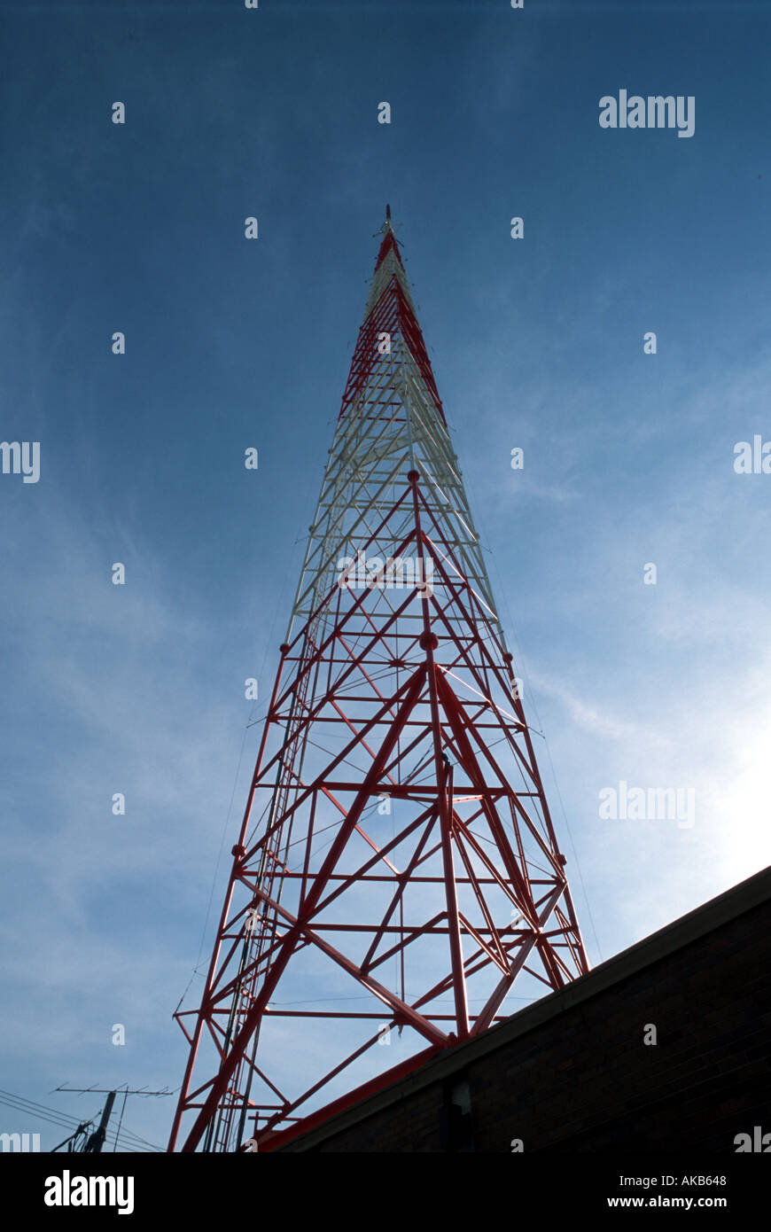 A monolithic red and white steel communication system with satellite ...