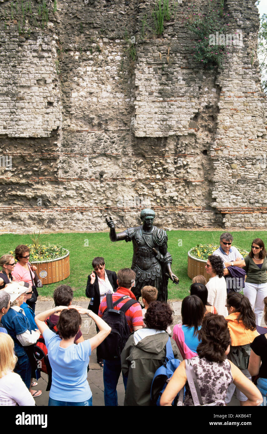 England, London, Tower Hill, Tour Group in front of Roman Emperor ...