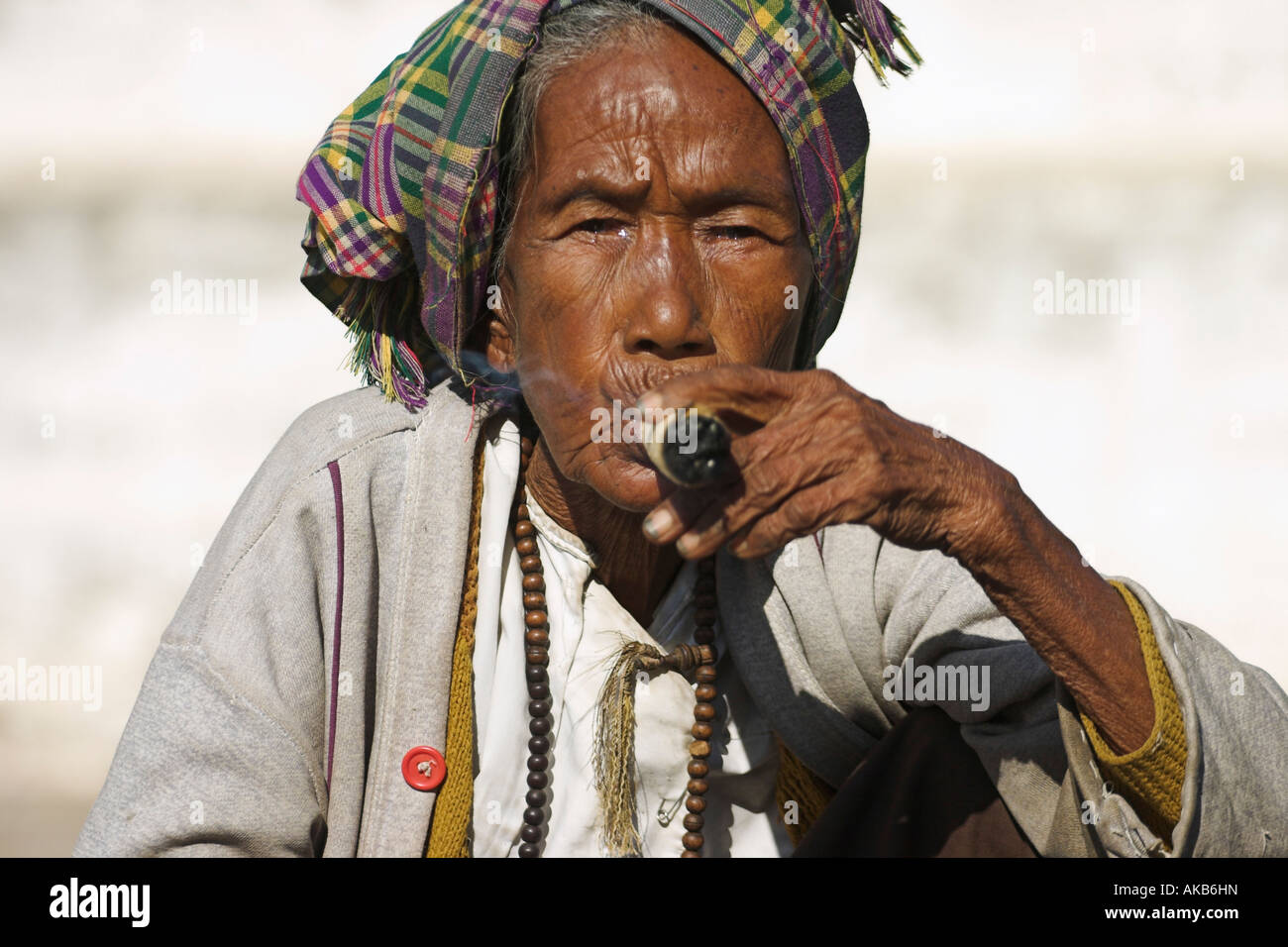 Myanmar, Bagan, Myanmar, Bagan, Shwezigon Paya, Lady smoking sheroot ...