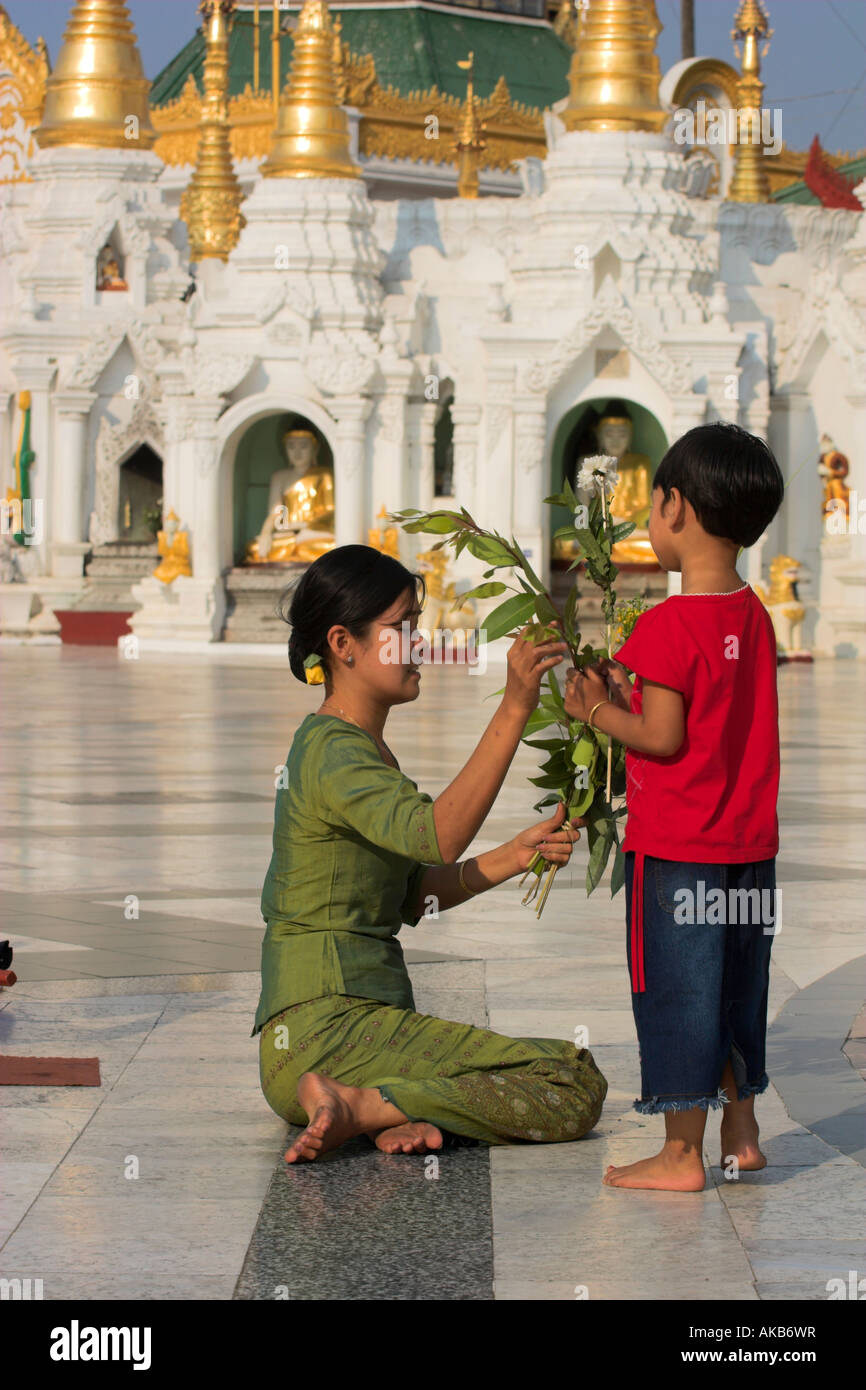 Myanmar (Burma), Yangon (Rangoon), Shwedagon Paya, Mother gives ...
