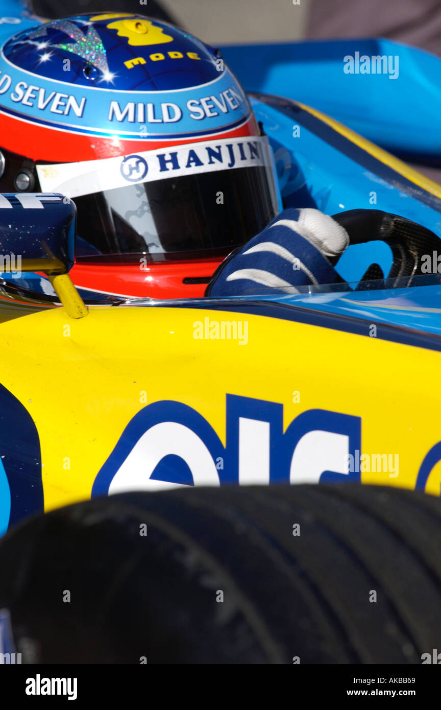 Driver Fernando Alonso from Spain in his racing car at the Circuit de ...