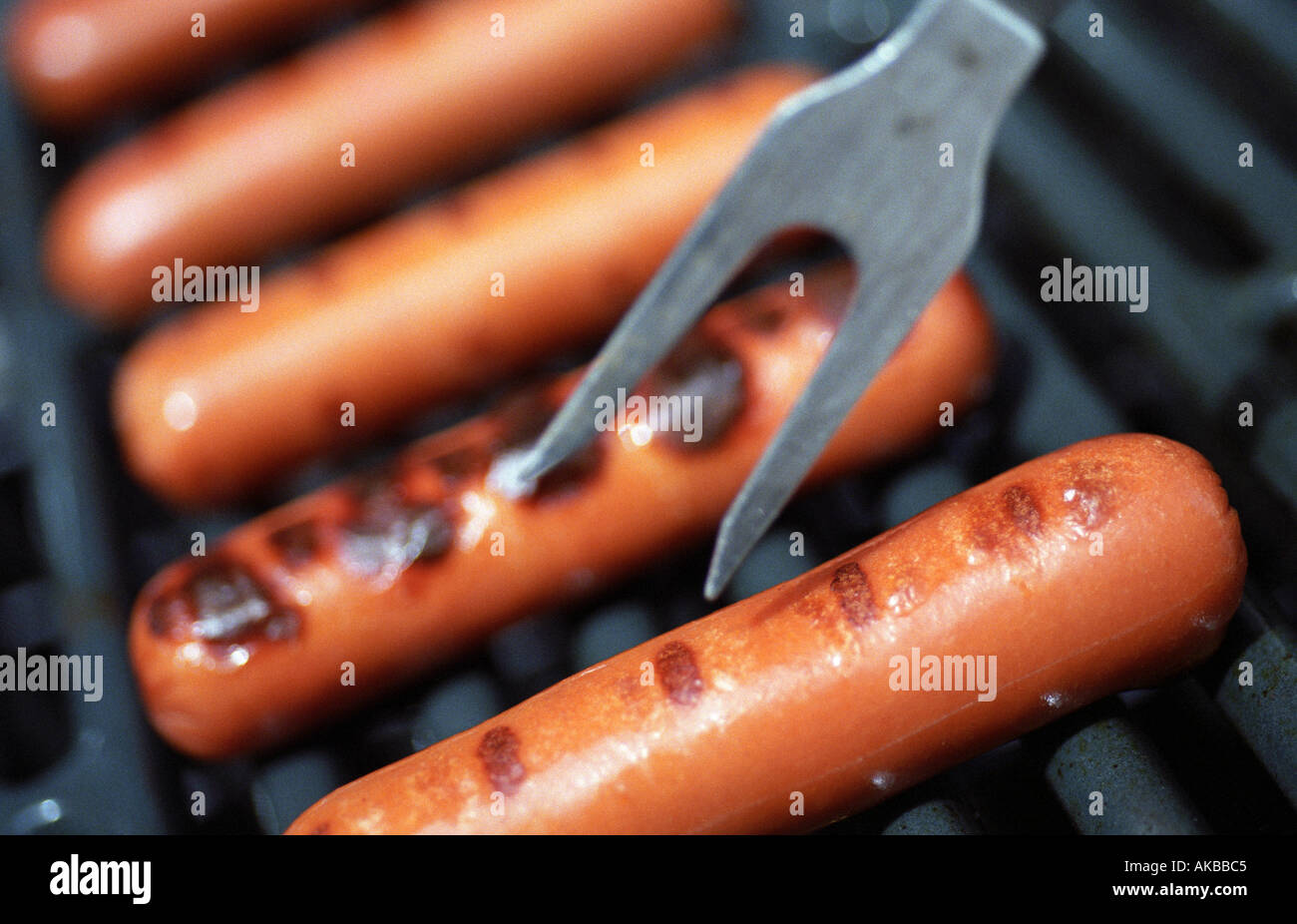 Hotdogs on grill Stock Photo - Alamy