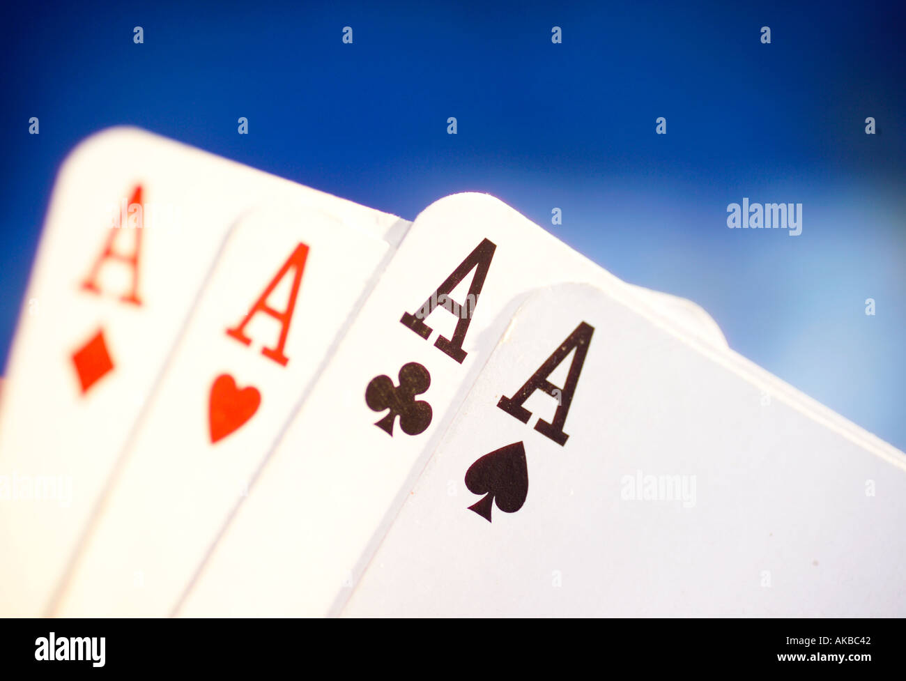 Four aces in hand cards hi-res stock photography and images - Alamy