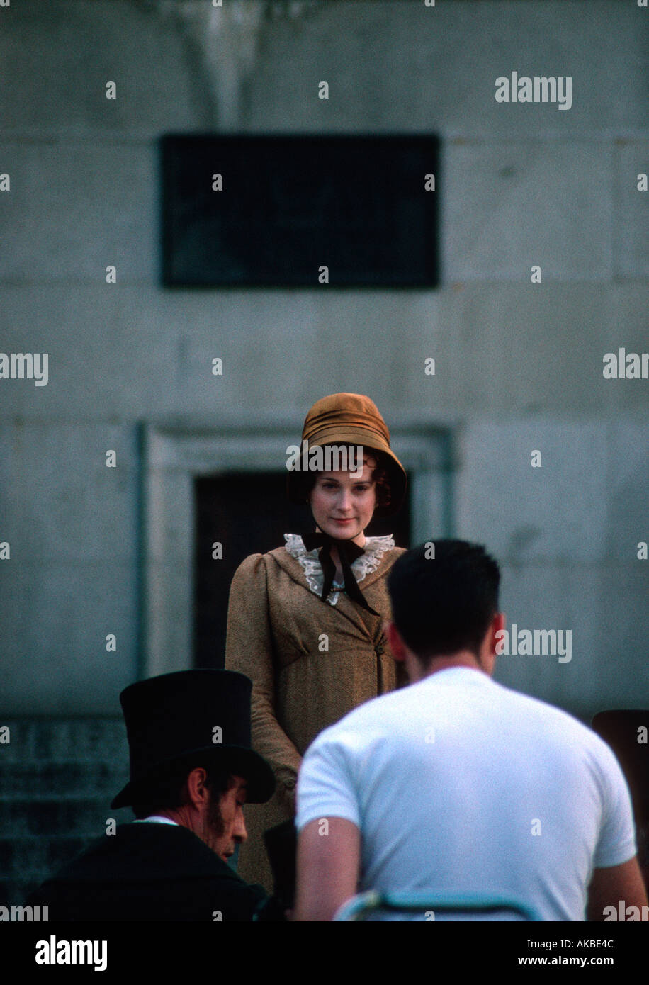 Stills photographer with actors as Victorian gentleman and lady on ...