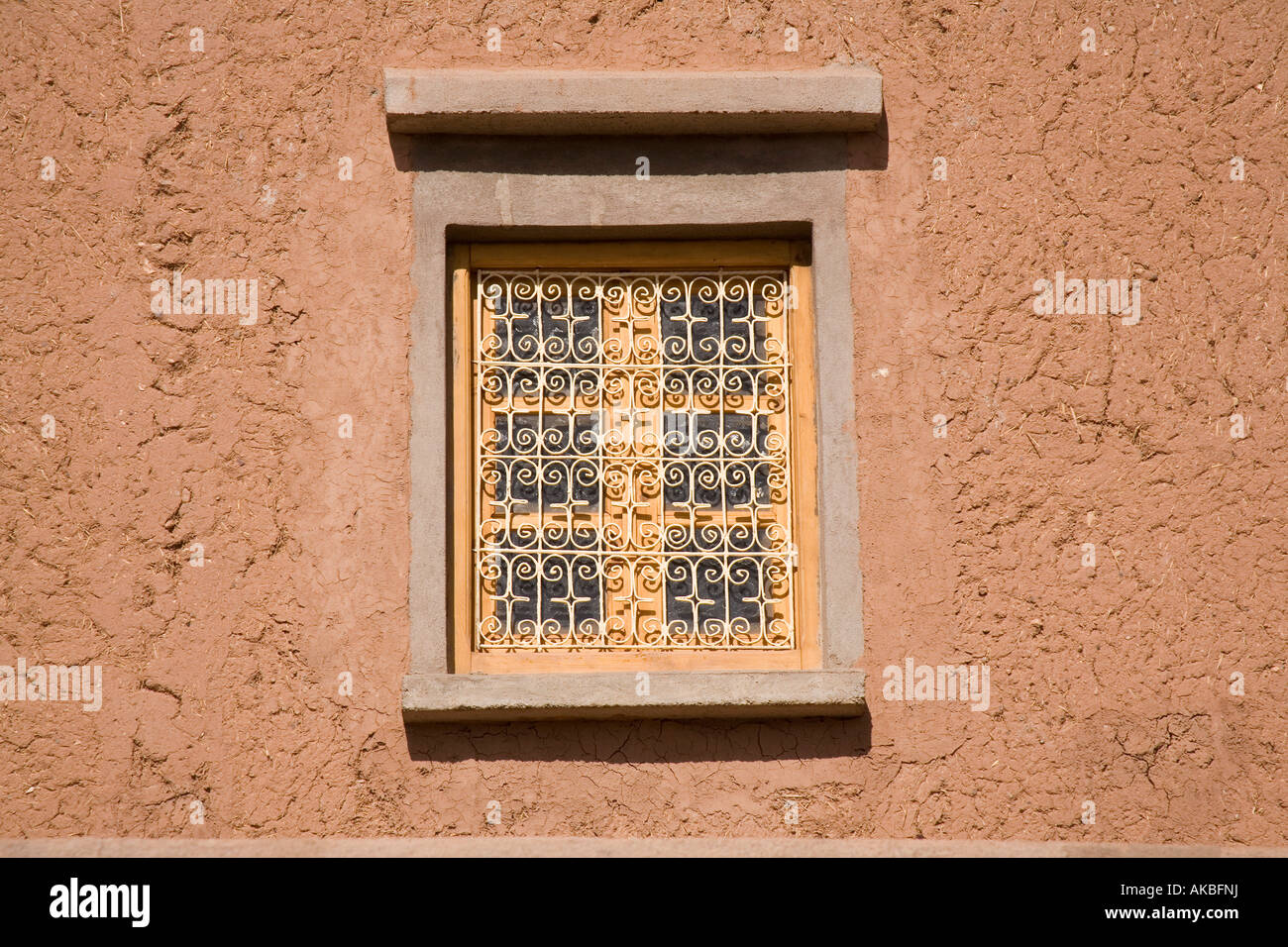 Moroccan traditional window with artisan ironwork grill Stock Photo - Alamy