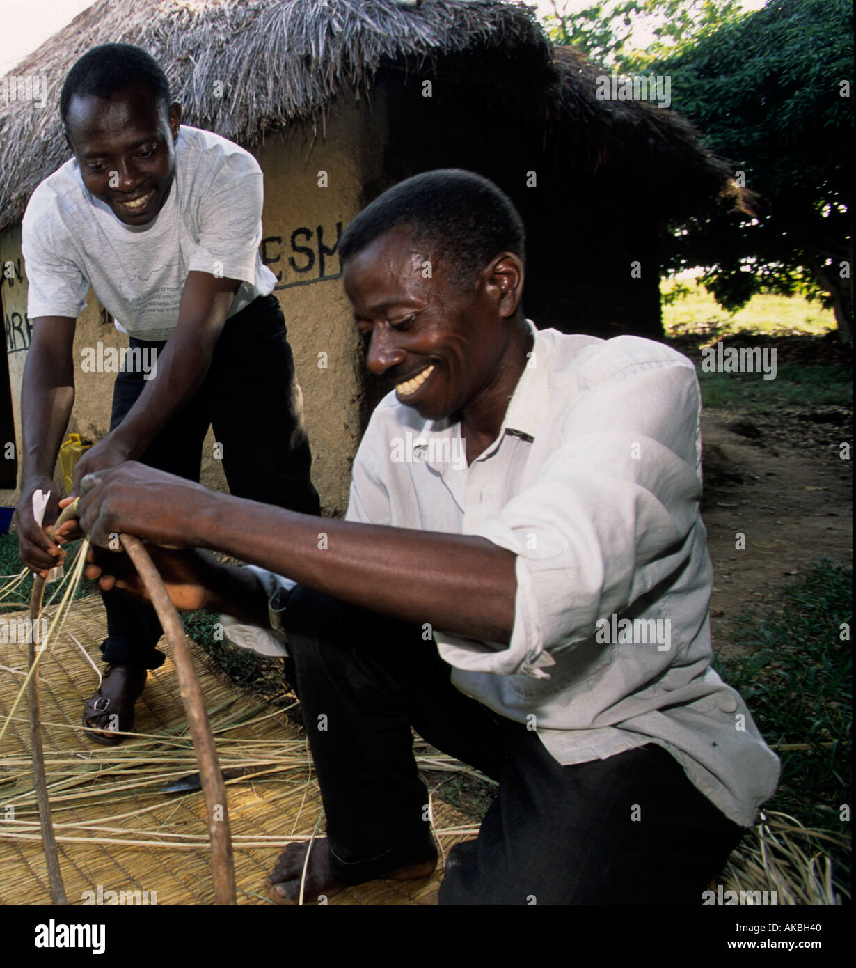 Men helping each other hi-res stock photography and images - Alamy