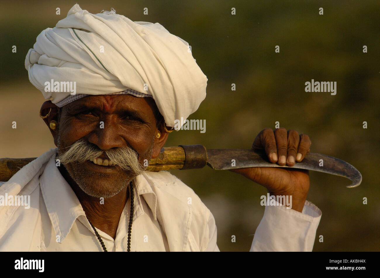 Rabari man wearing his everyday dress which usually includes a white ...