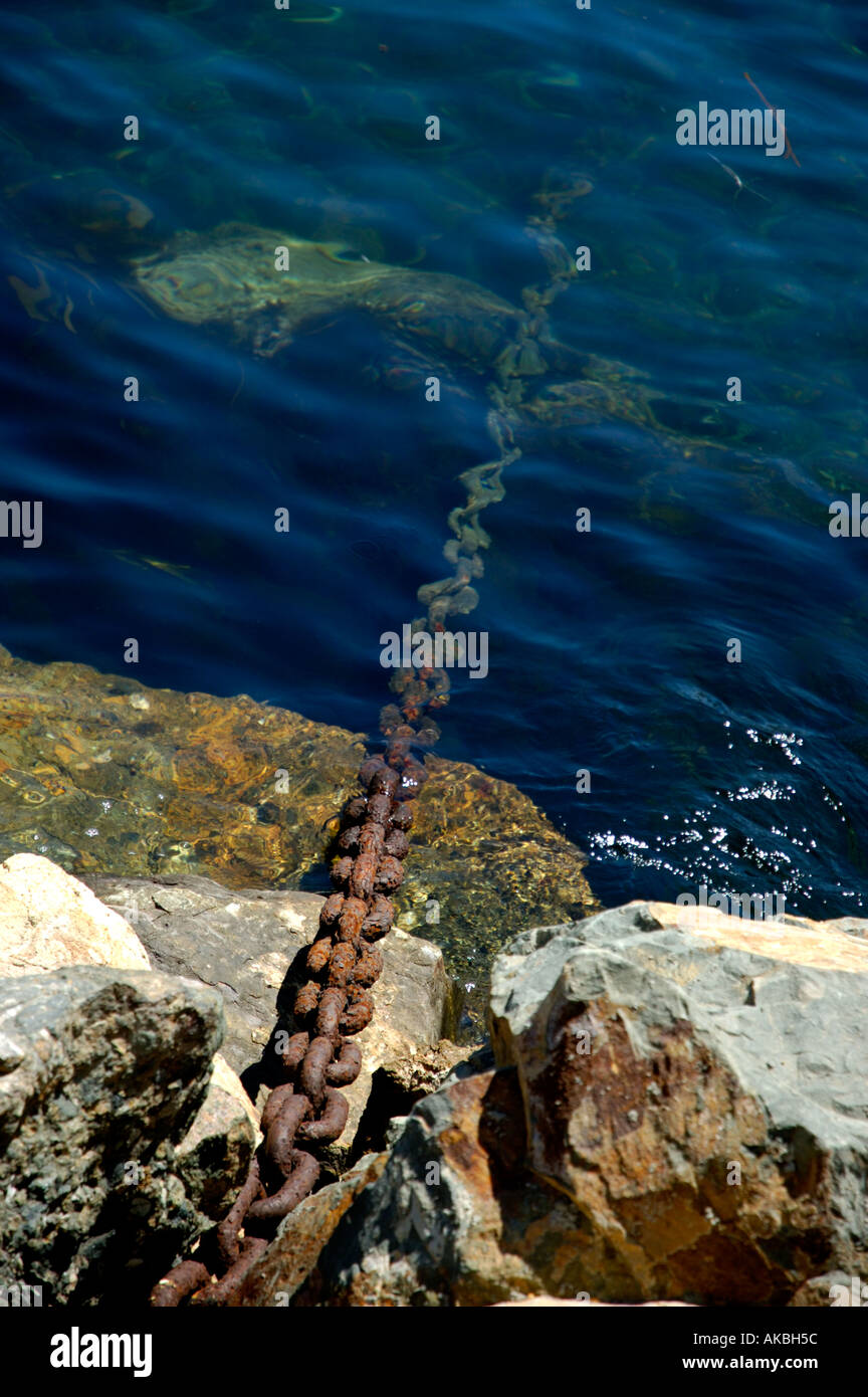 Old rusty chain going underwater Stock Photo - Alamy