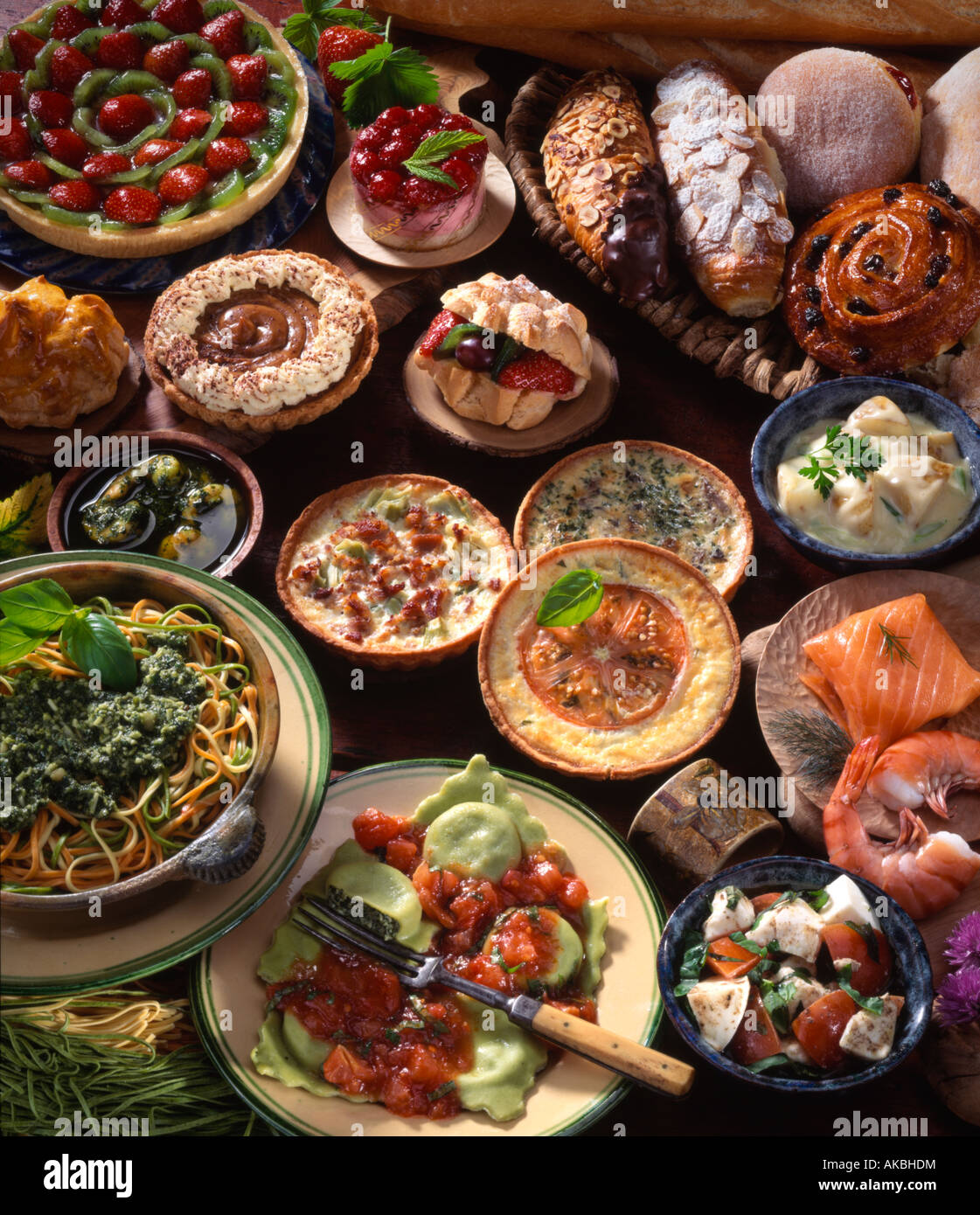 A buffet of quiches delicatessen danish pastries and seafoods editorial ...