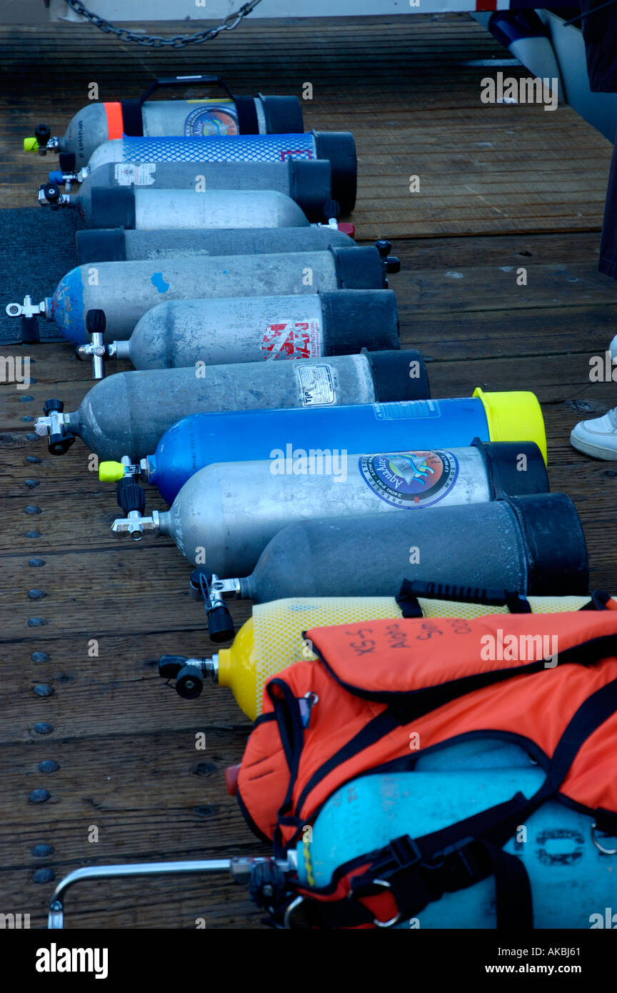 Diving equipment lined up on pier from boat Stock Photo - Alamy