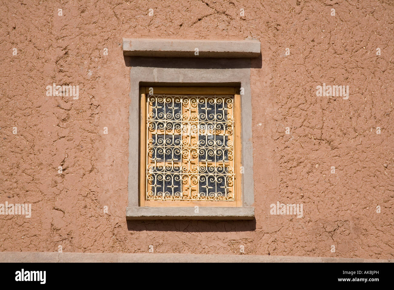 Moroccan traditional window with artisan ironwork grill Stock Photo - Alamy