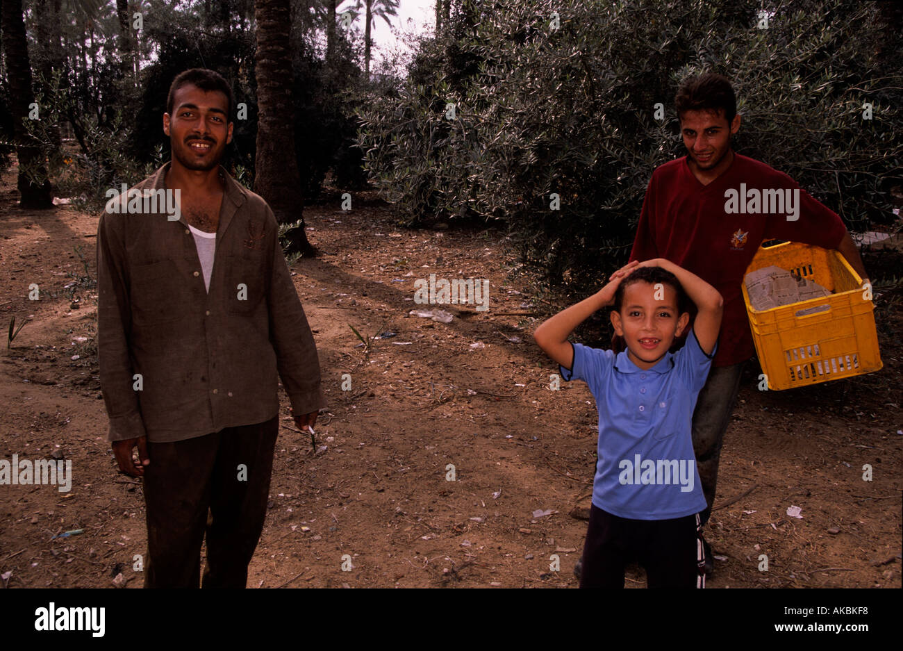 Friendly locals smiling at the camera Stock Photo - Alamy