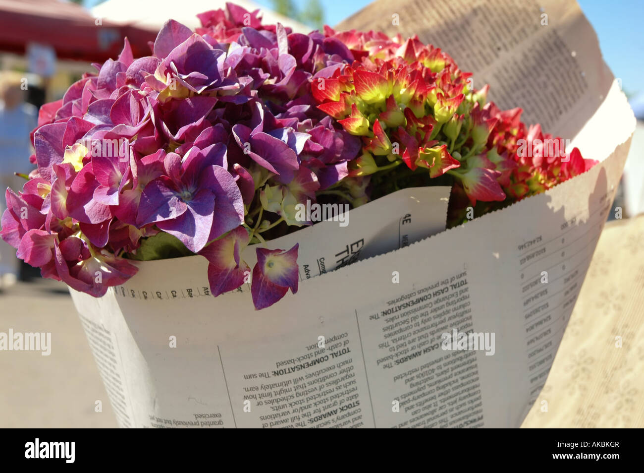 Flowers wrapped in newspaper hi-res stock photography and images - Alamy