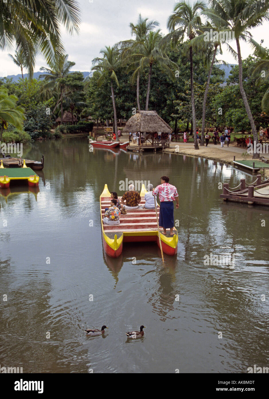 Visitors tour the Polynesian Cultural Center in a canoe raft Stock ...