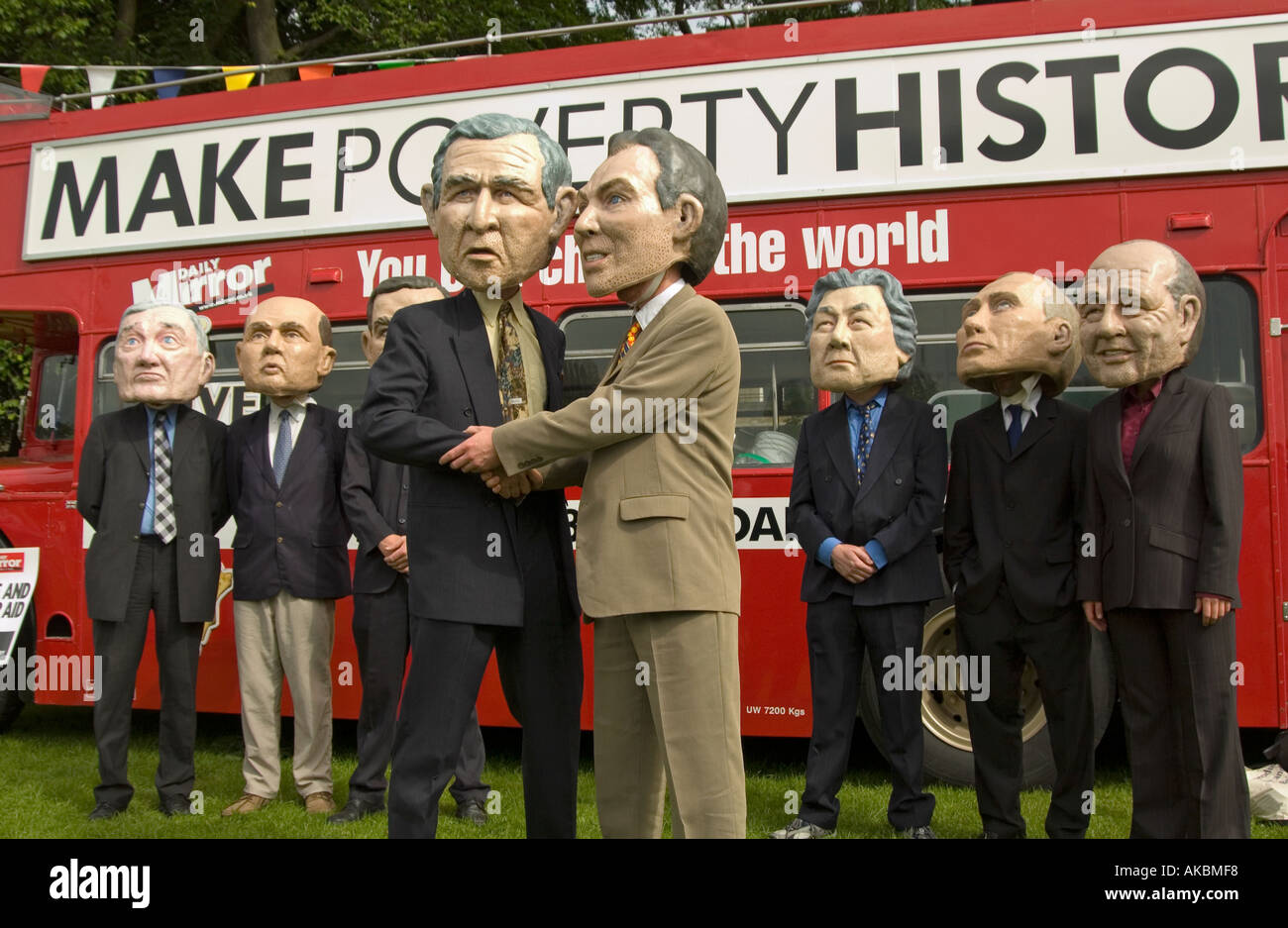Men wearing papier-mache heads of Bush, Blair, Putin at Make Poverty ...
