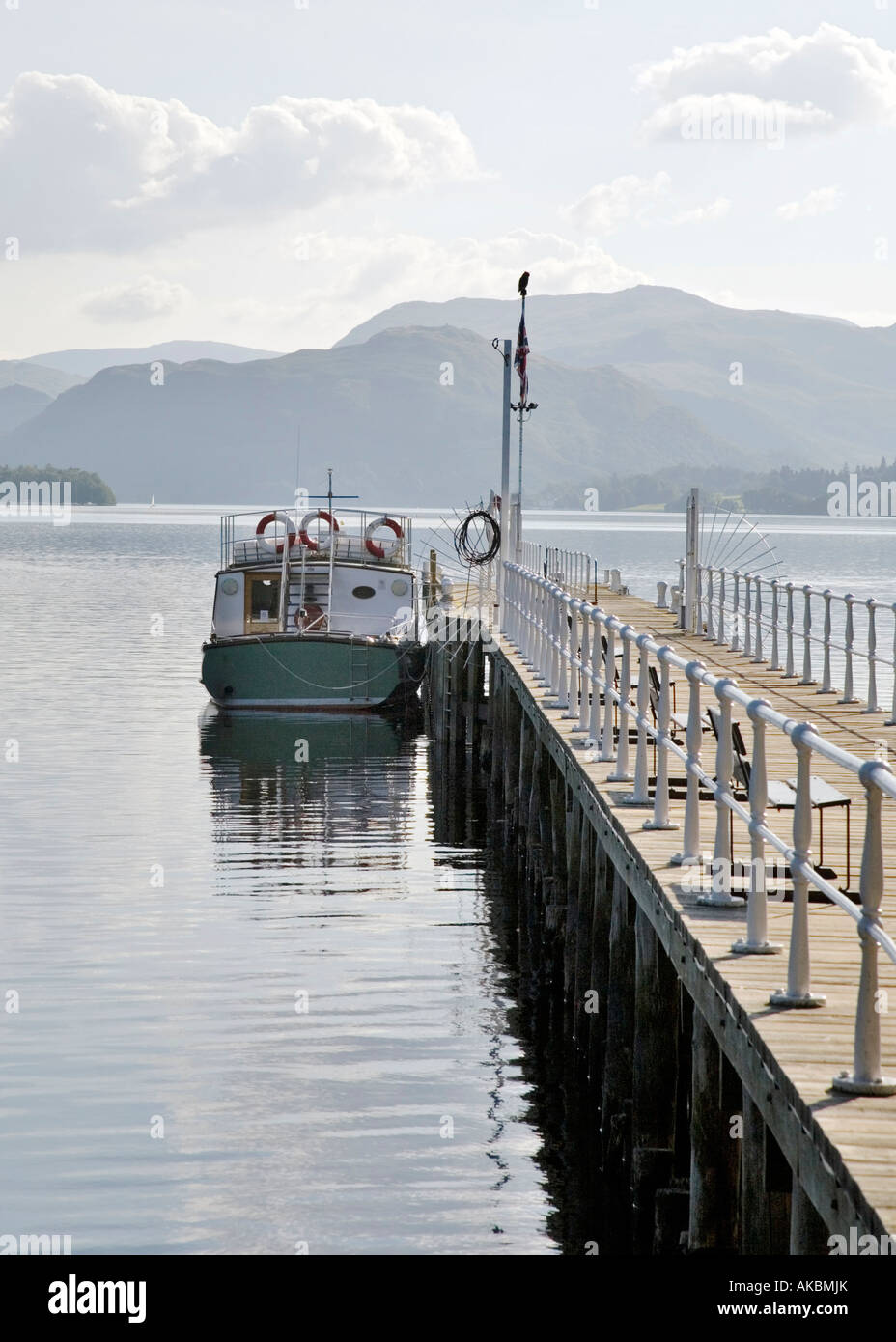 Boat anchored at Jetty Ullswater Lake District National Park Cumbria ...