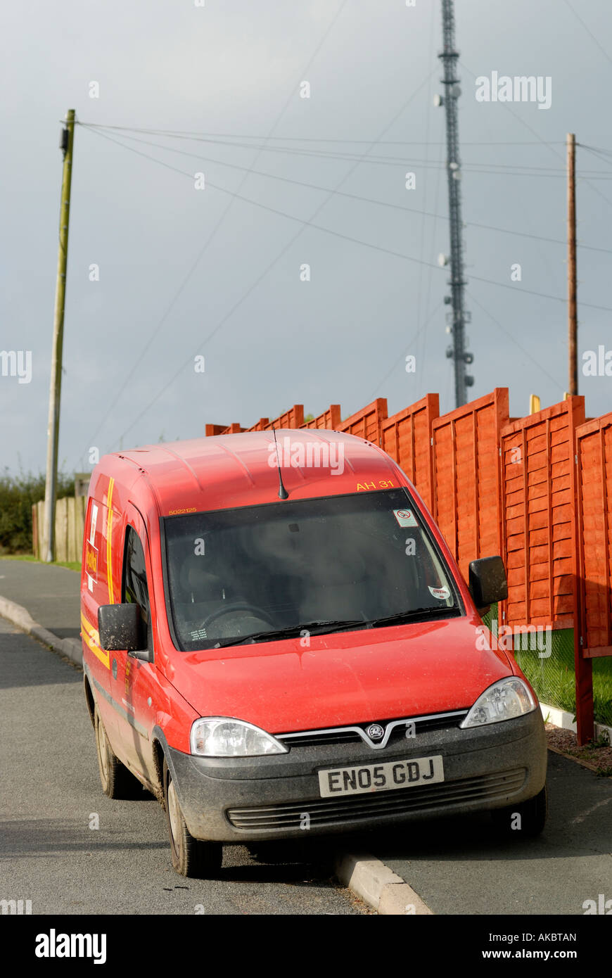 Parked post van with TV transmitter and telephone wires in the ...
