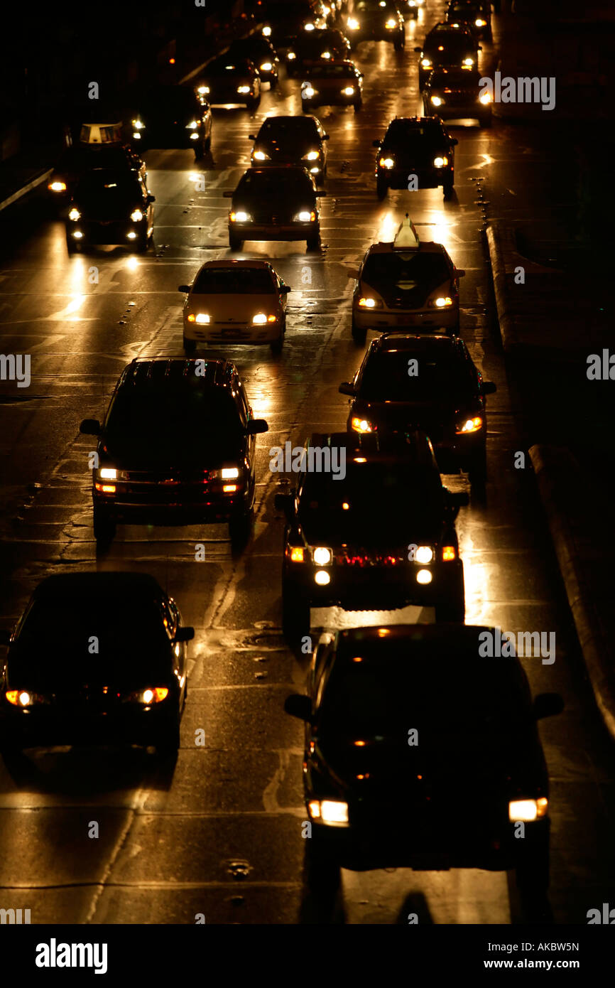 Vehicle Traffic on a rainy night Stock Photo - Alamy