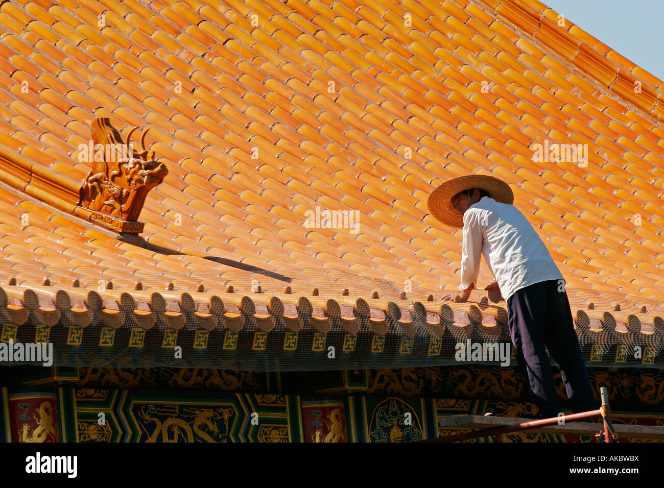 Asian workers repairing Buddhist Temple Stock Photo - Alamy
