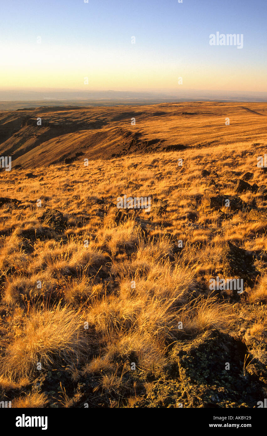 Sunset colors the desert slopes above the Kiger Gorge near the top of ...