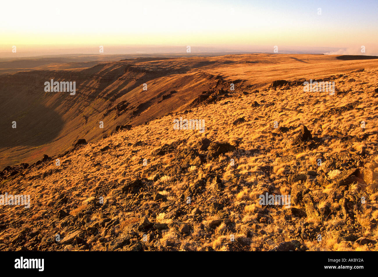Sunset colors the desert slopes above the Kiger Gorge near the top of ...