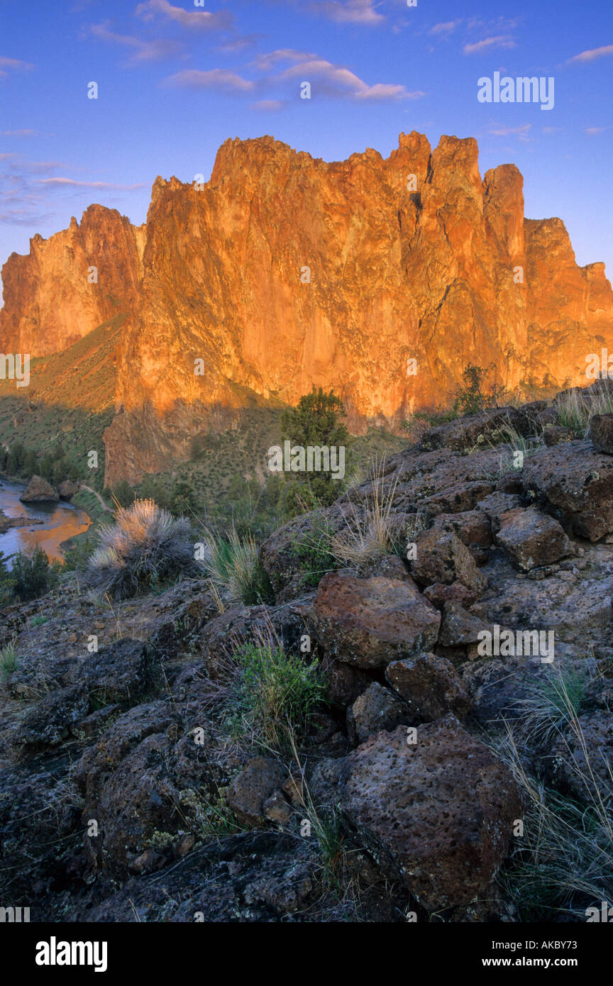 Sunrise colors the rugged rock formations in Smith Rock State Park ...