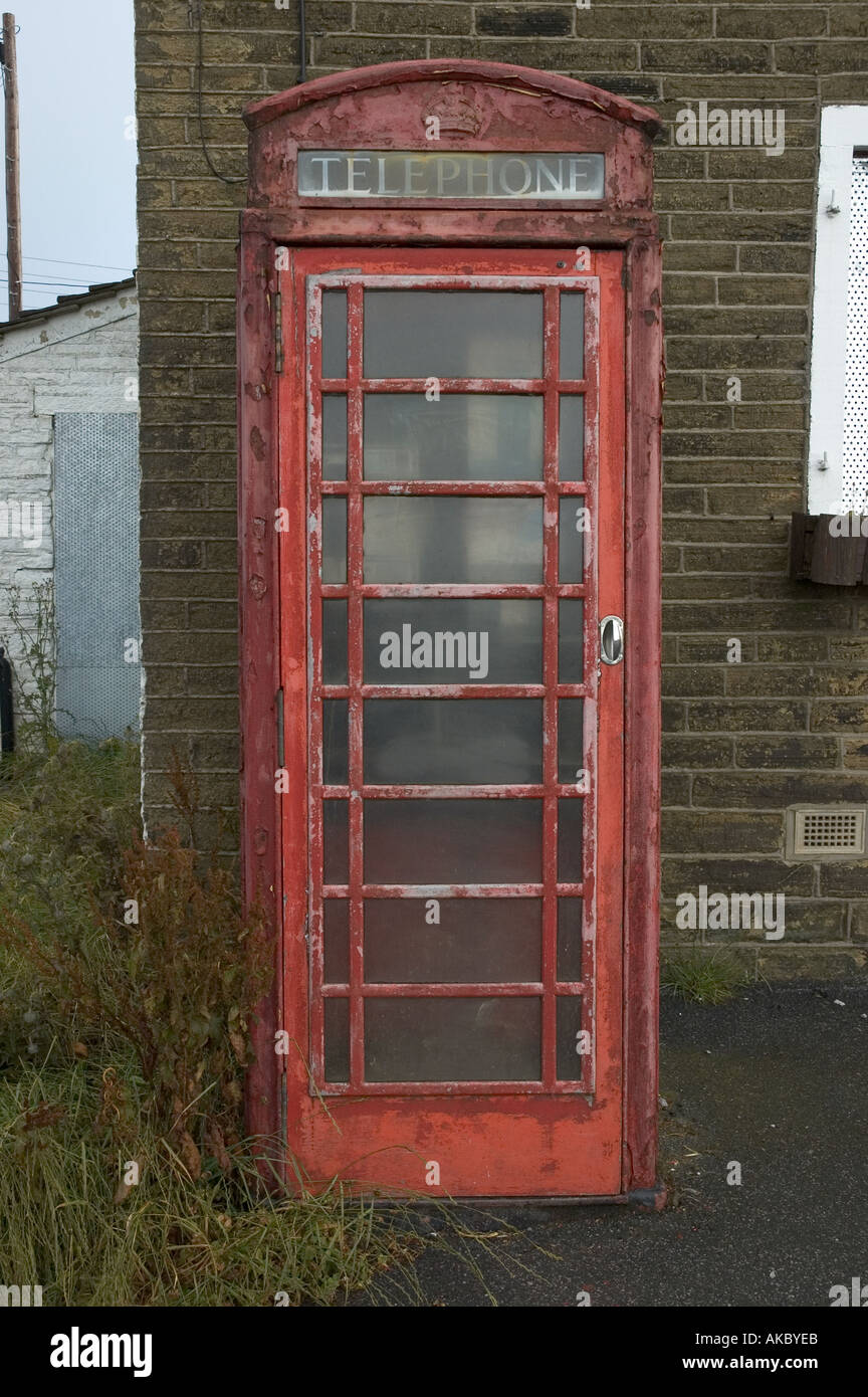 Disused red telephone box Stock Photo - Alamy