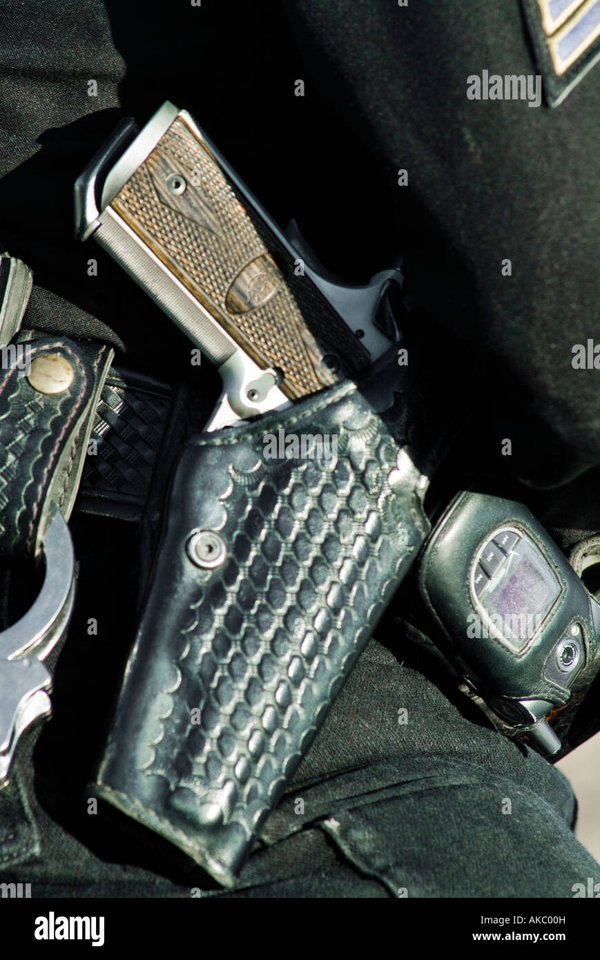45 automatic gun police weapon in leather holster Stock Photo - Alamy
