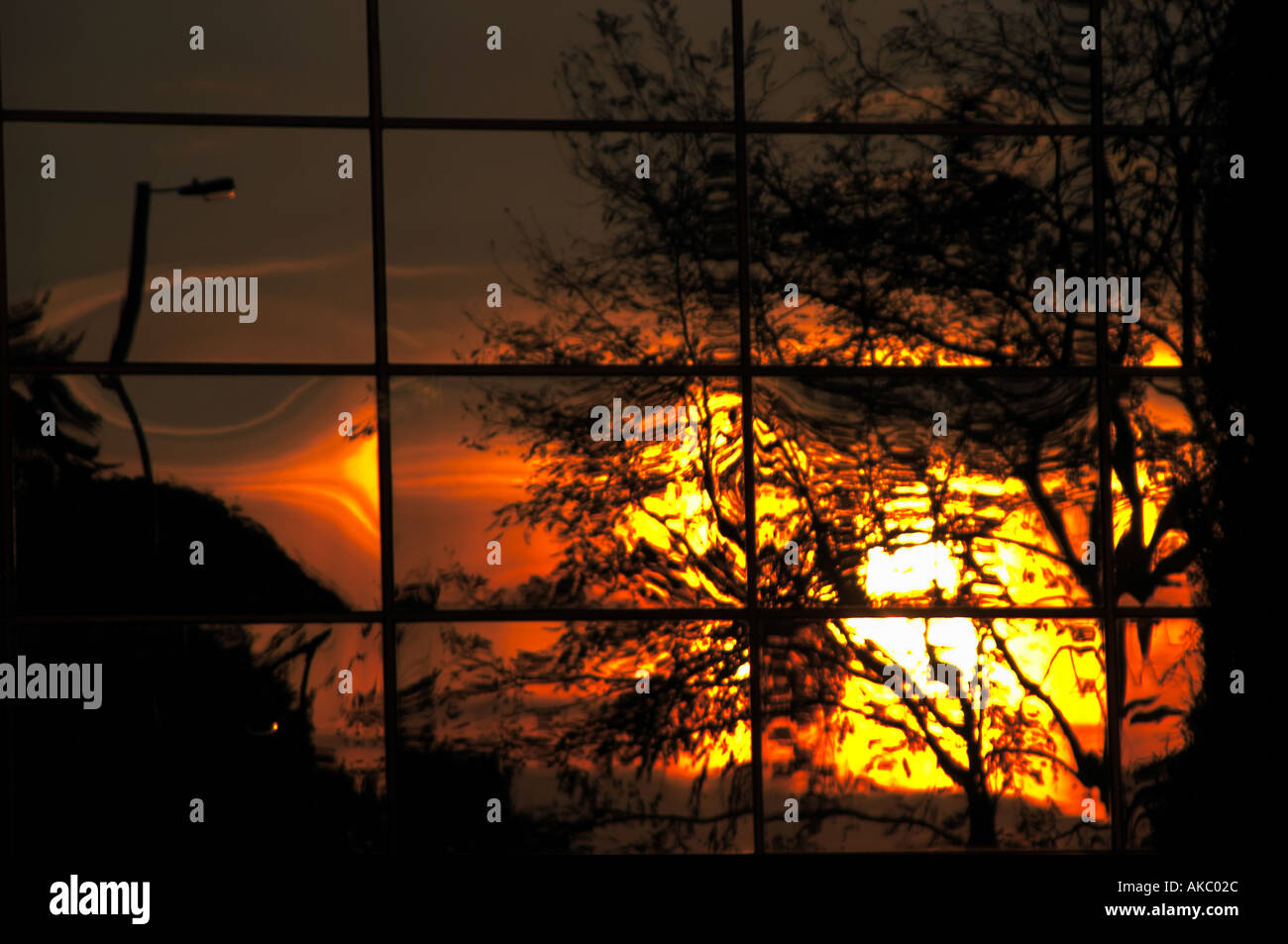 Fiery reflection in an office window Stock Photo - Alamy
