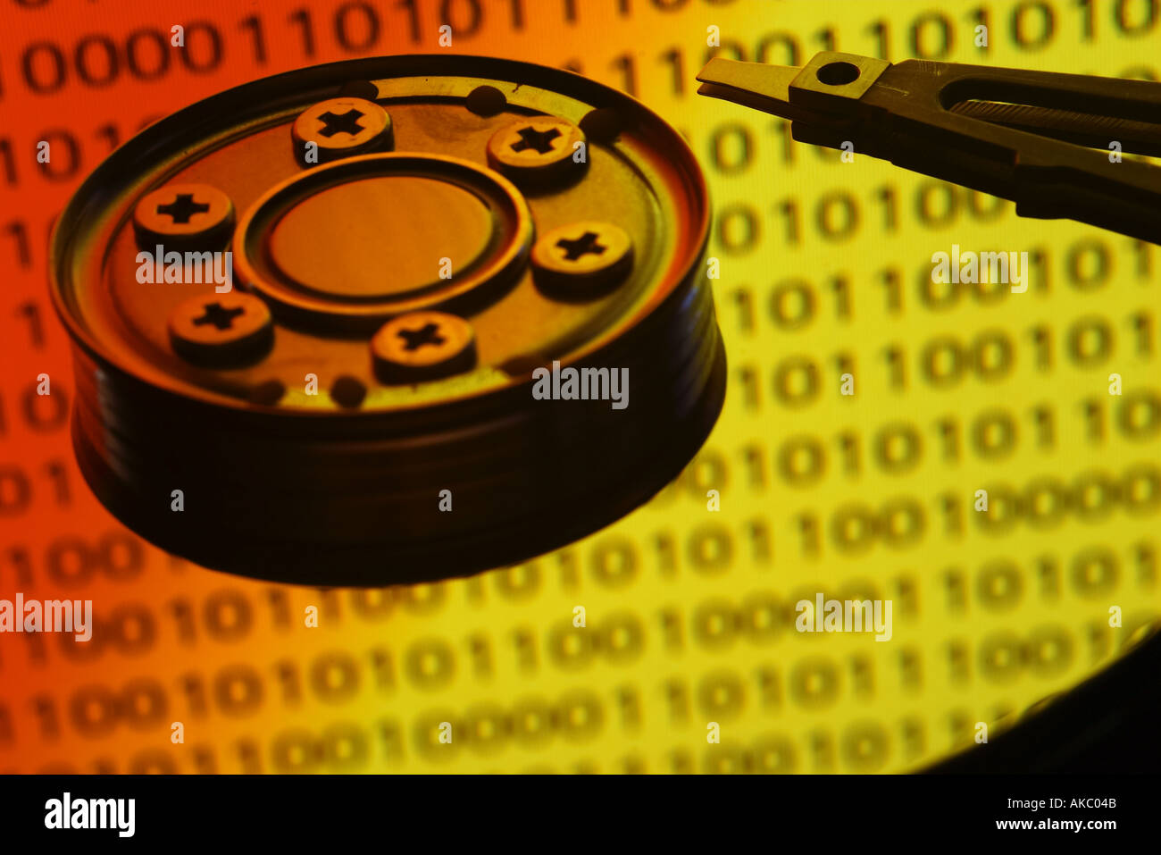 Hard disk platter Yellow and red with binary Stock Photo - Alamy