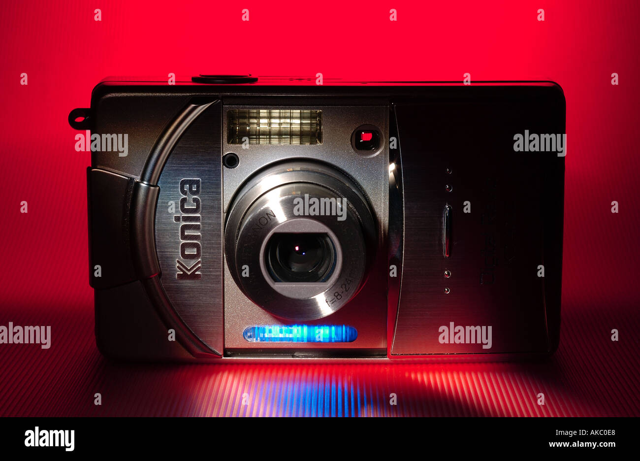 Konica digital camera on red background Stock Photo - Alamy