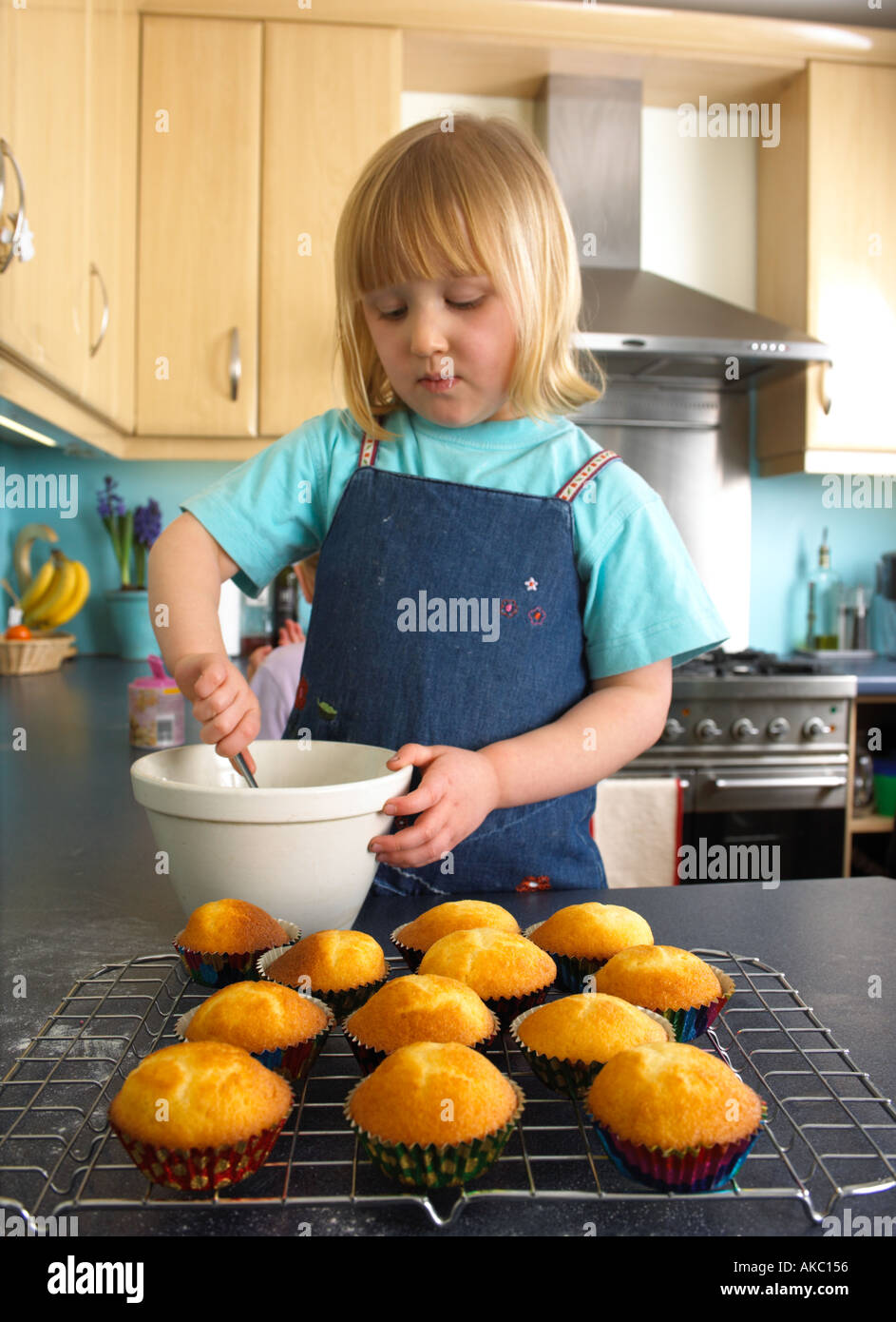 Children cooking cakes in kitchen hi-res stock photography and images ...