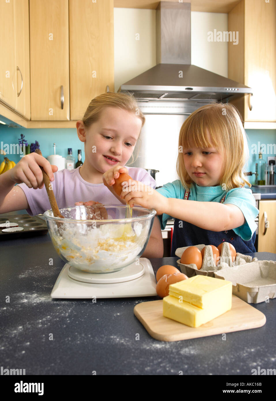 Kids making mess in kitchen hi-res stock photography and images - Alamy