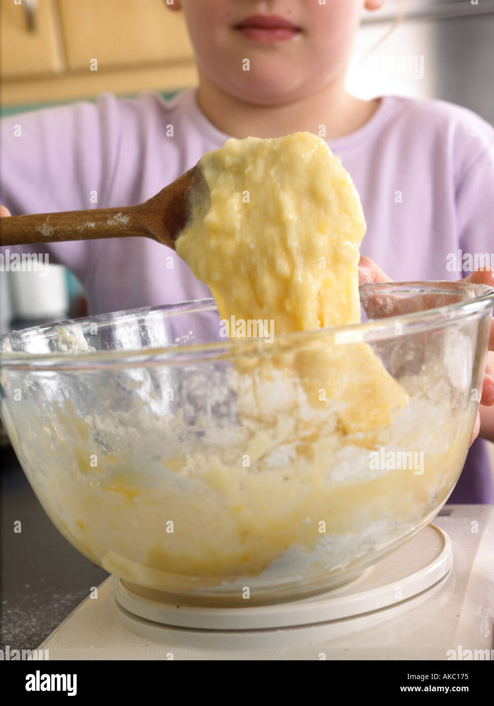 Children cooking cakes in their kitchen at home Stock Photo - Alamy