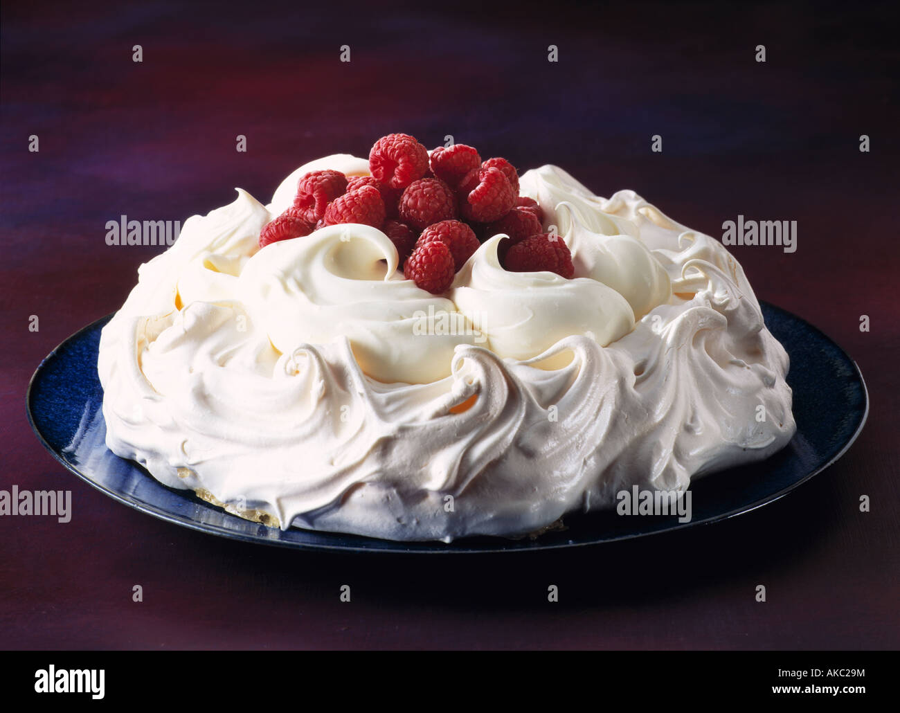 A whole raspberry Pavlova dessert editorial food Stock Photo - Alamy