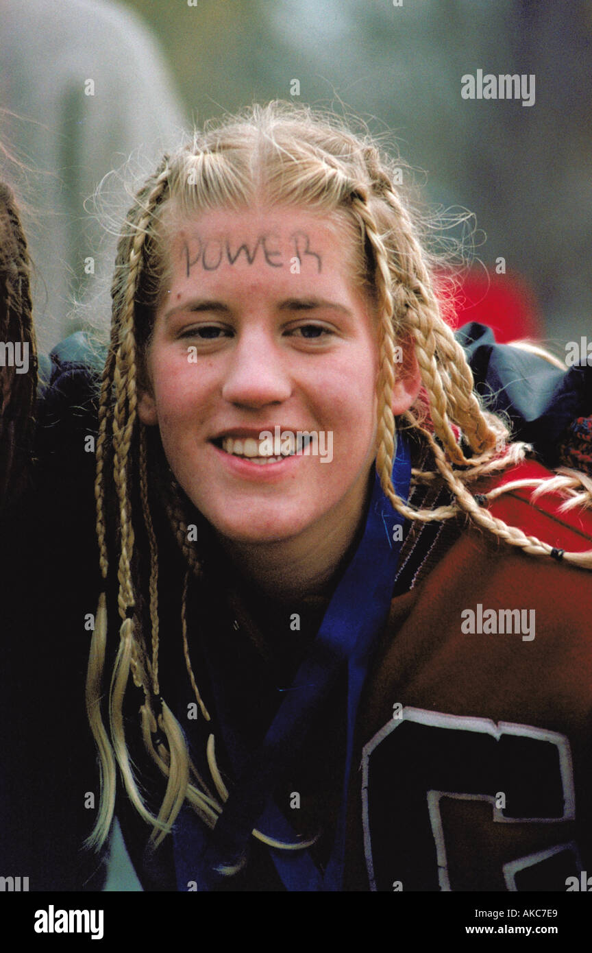 Female cross-country runner age 16 with power written on forehead as a ...