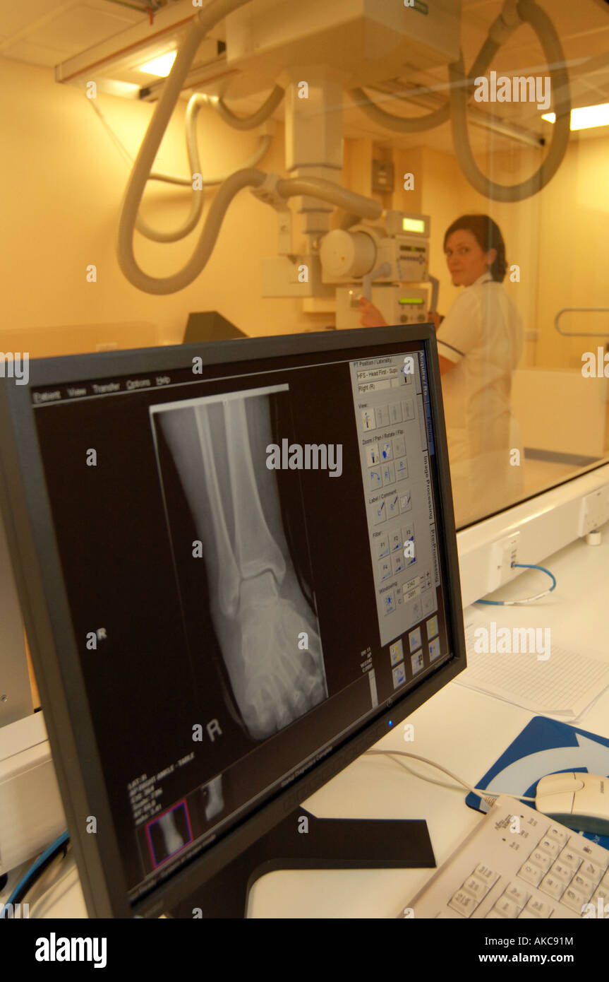 A radiographer uses new technology to take xrays of a patient at a ...