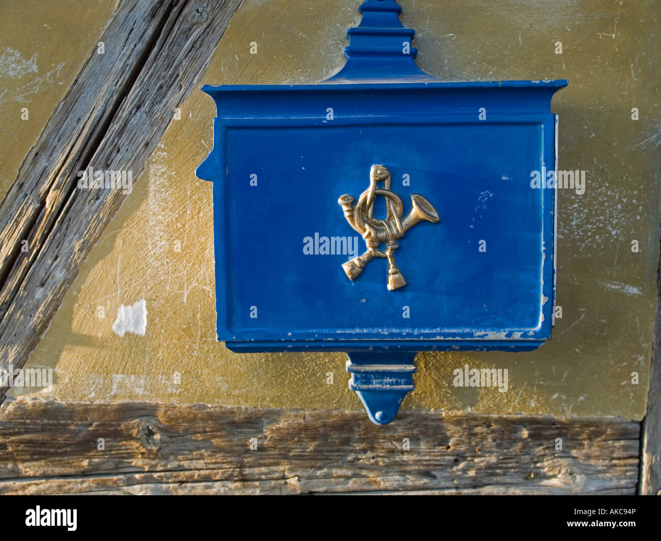 old historic letter box mail box with the symbol post horn Stock Photo ...