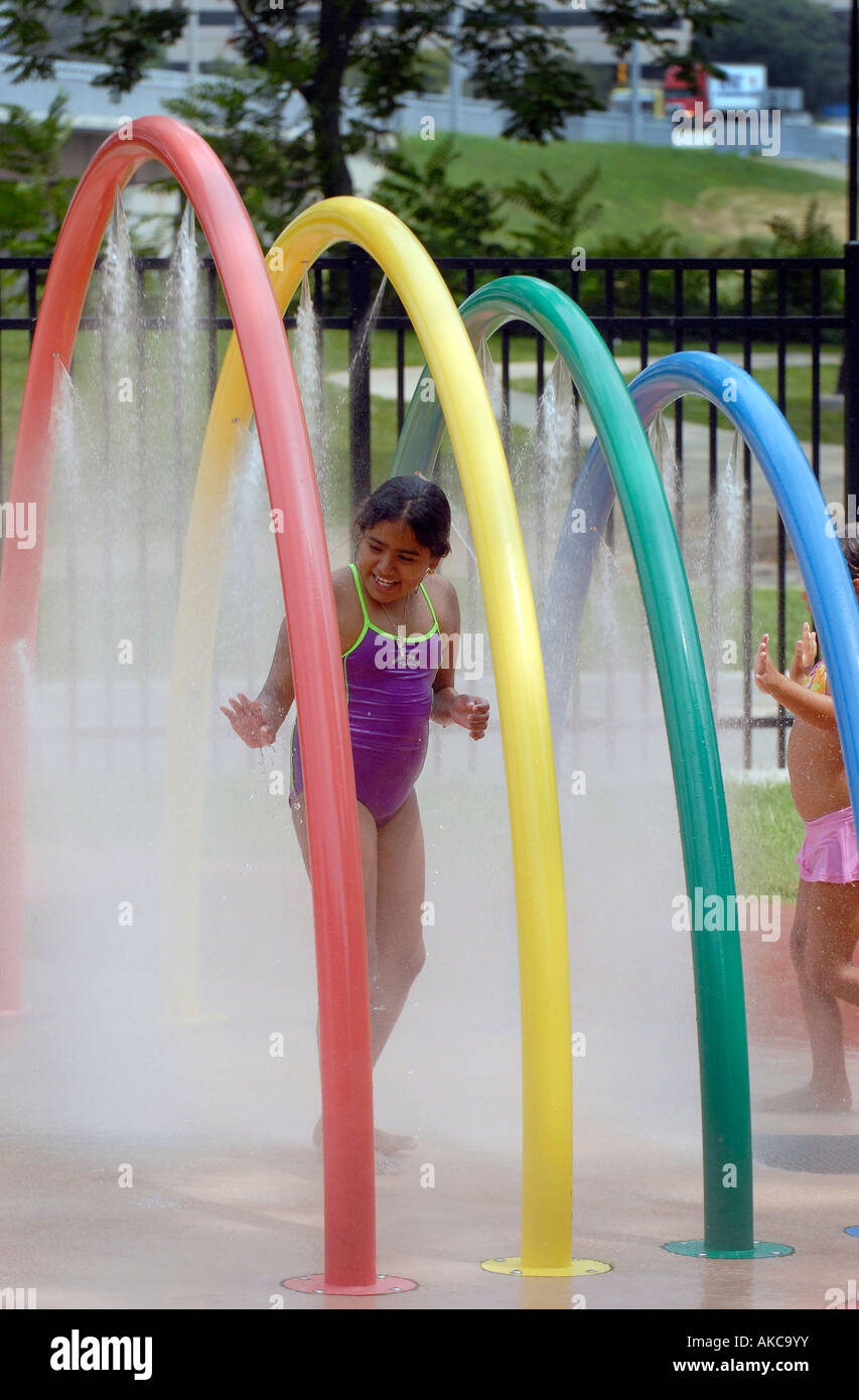A hispanic girl plays in a water park in the U S Stock Photo - Alamy