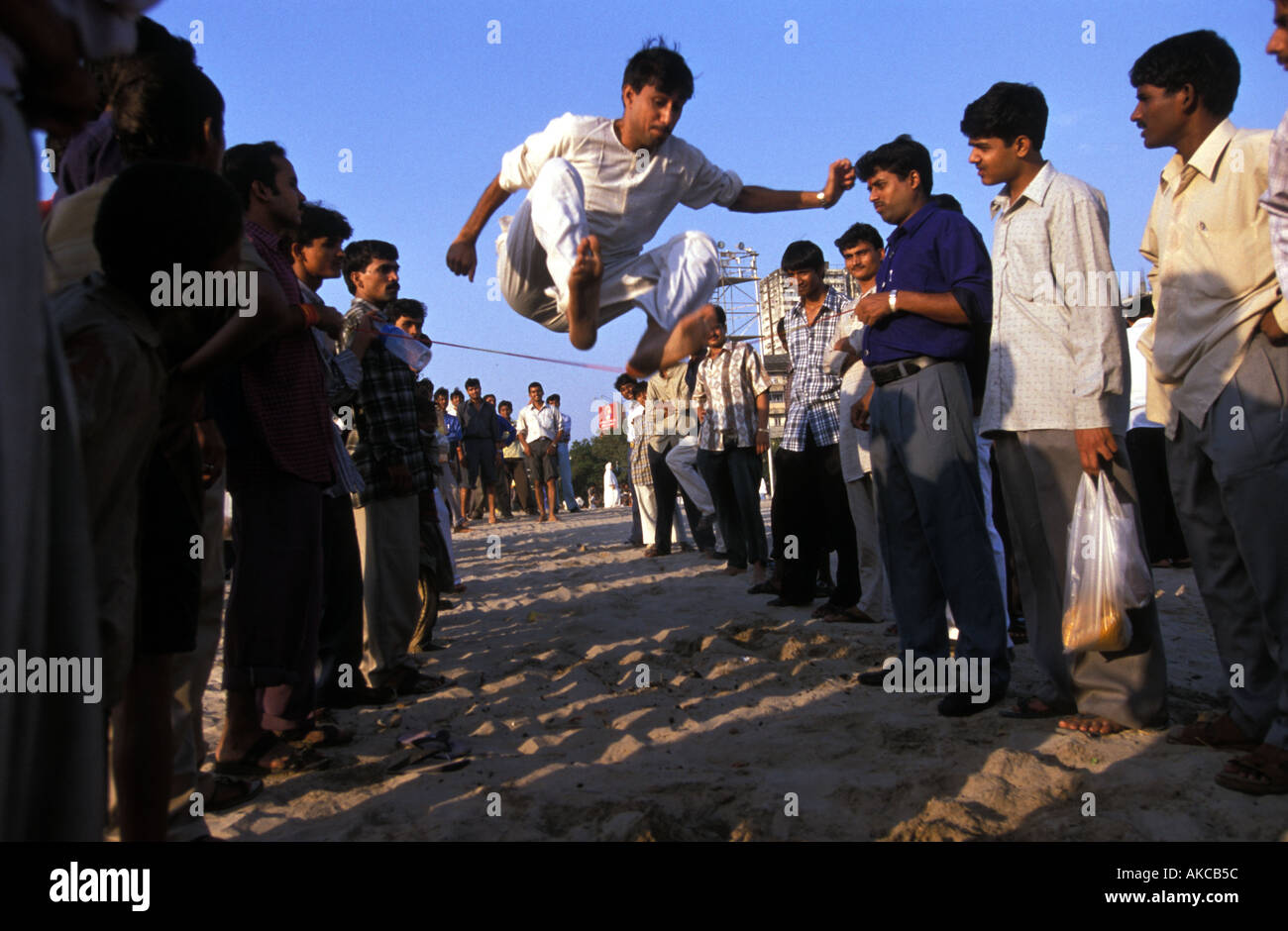 High jump competition Chow Patty Beach Mumbai India Stock Photo - Alamy