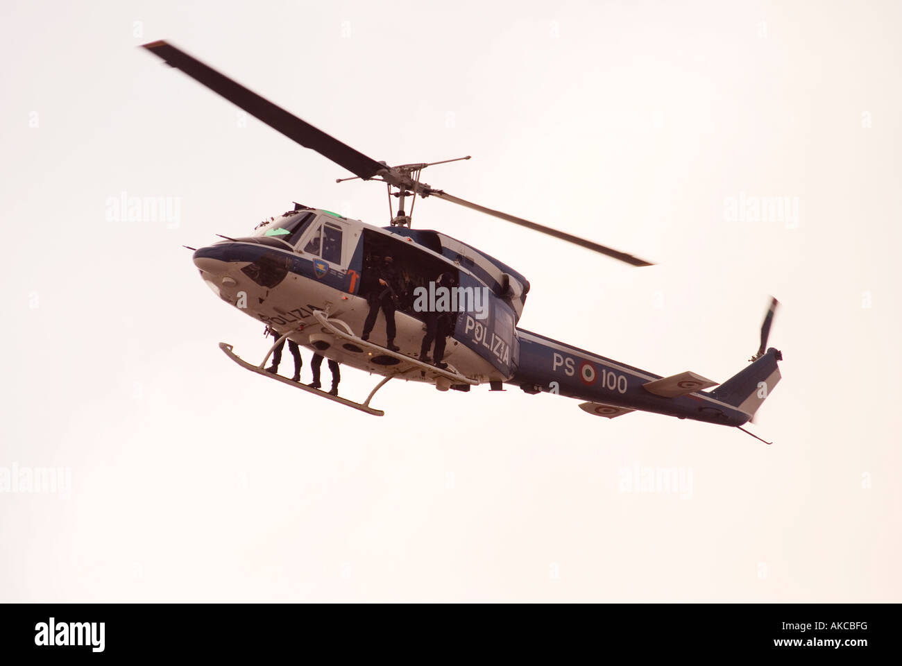Police helicopter with special police team Stock Photo - Alamy
